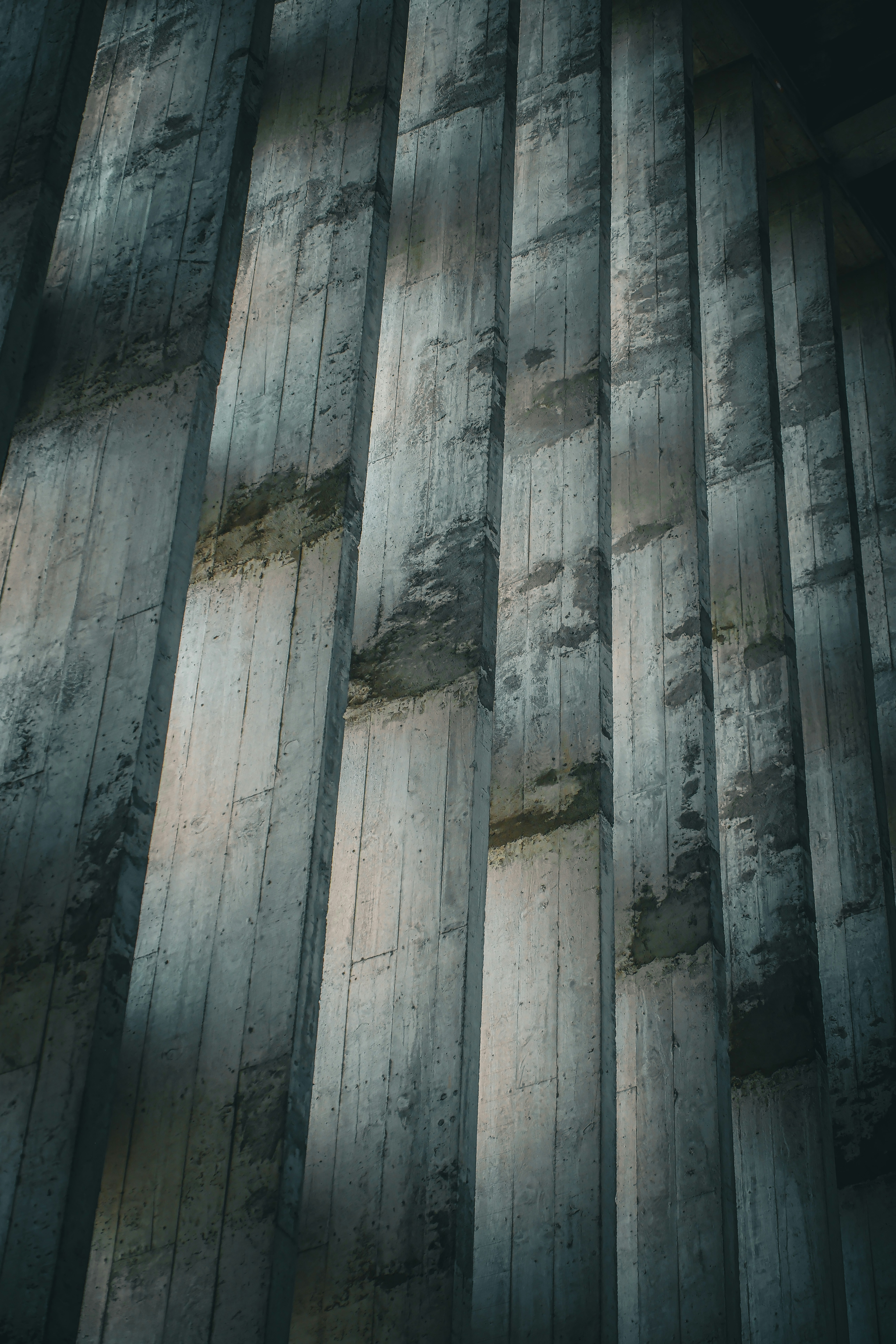Vertical Concrete Echoes: A Palette of Weathered Stripes
