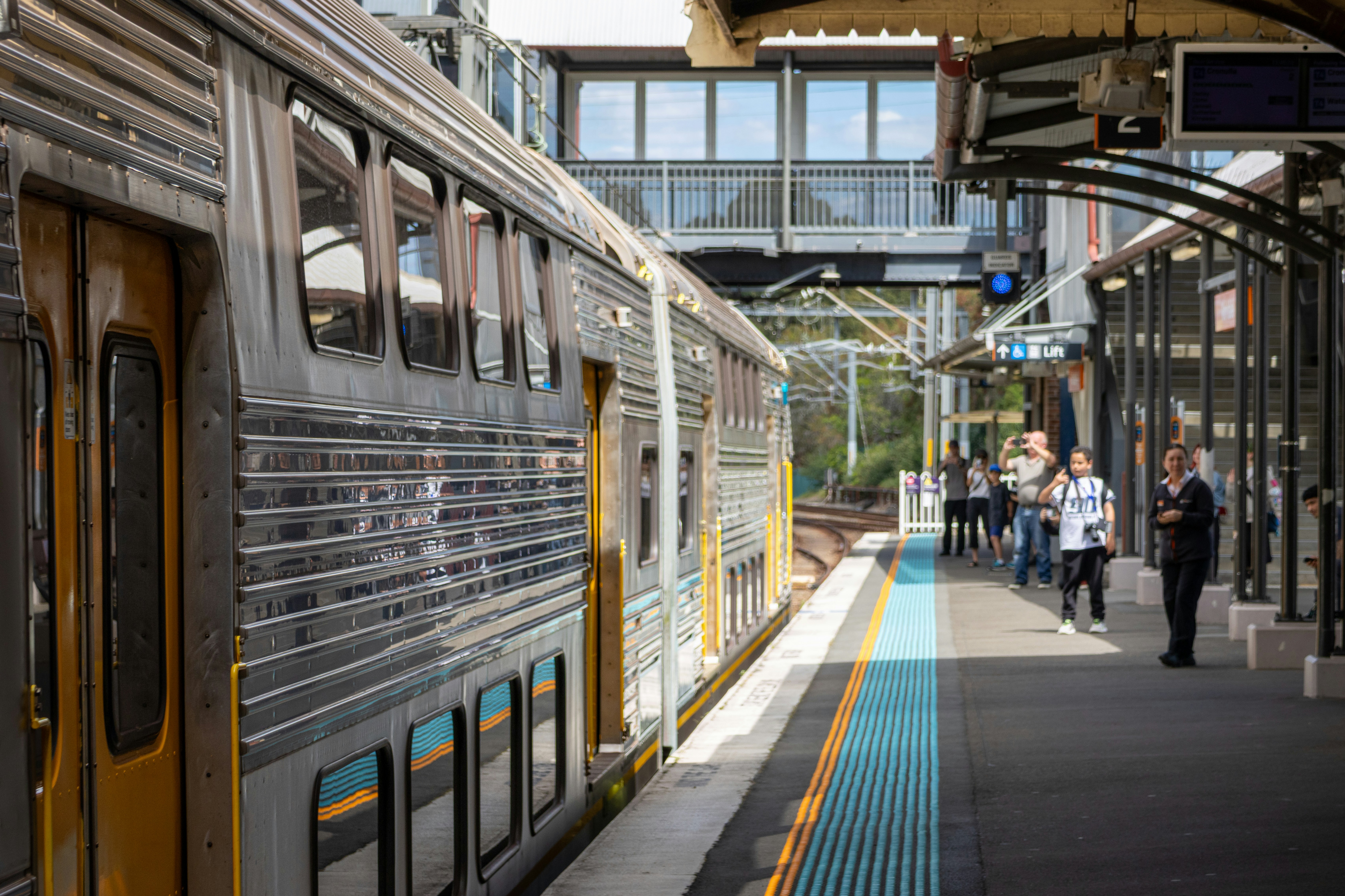 Railway Concourse: A Sleeper Train Glides Past Platform Interactions