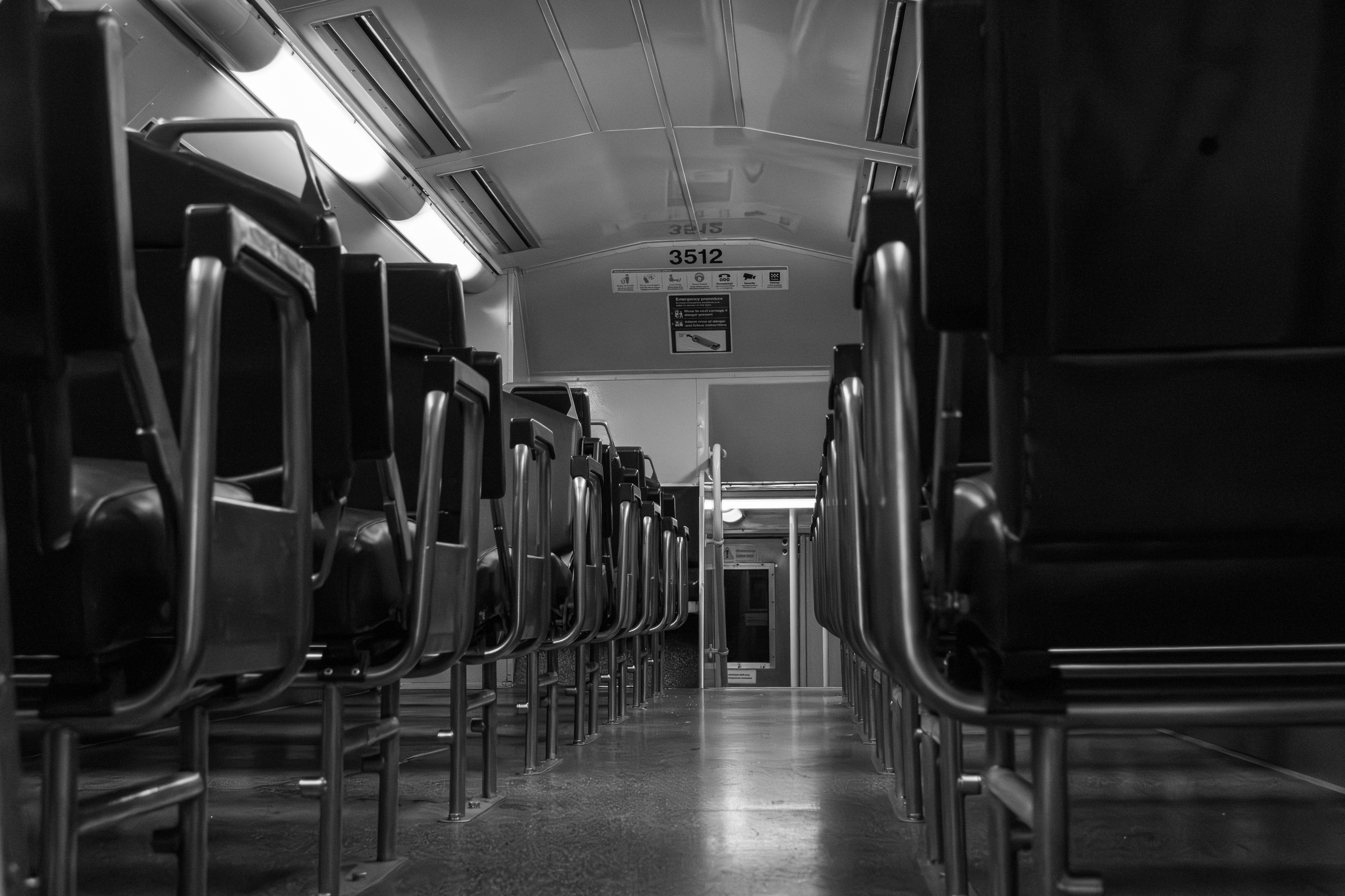 Empty Railcar Aisle: Symmetry and Silence in Railcar Blues