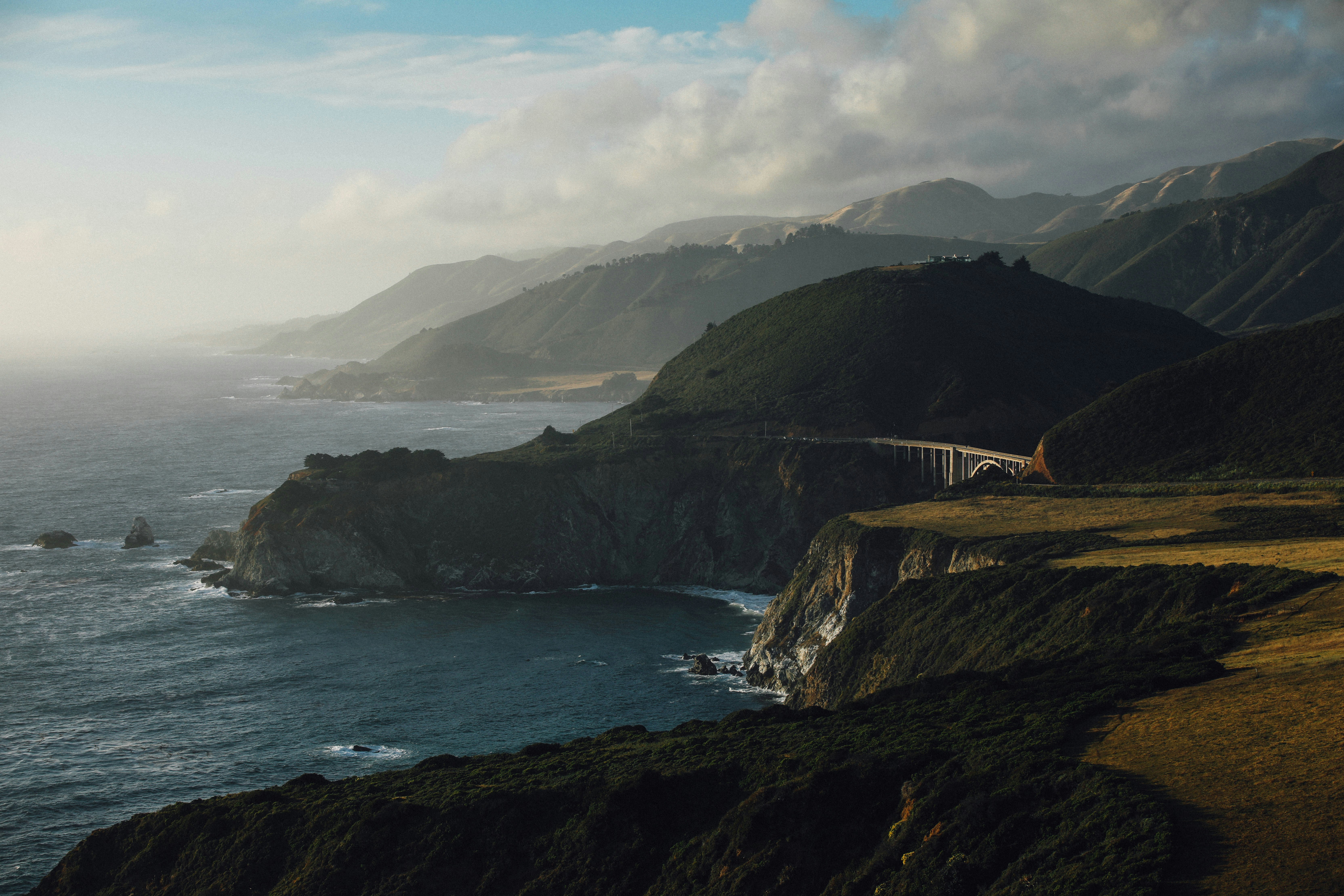 Coastal Highway Overlook: Sunset Light on a Winding Ridge