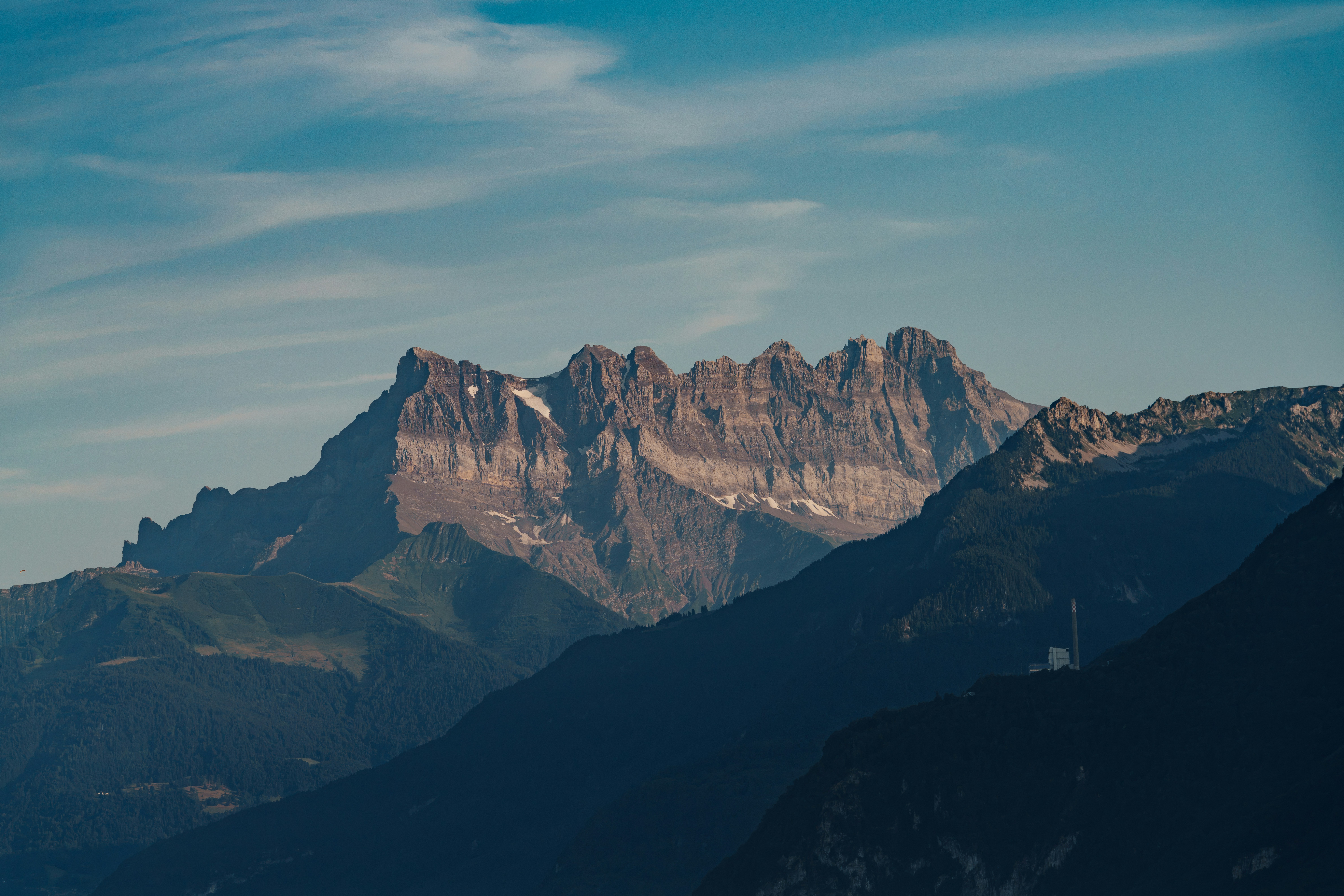 Distant Alpine Crest Under A Clear Sky
