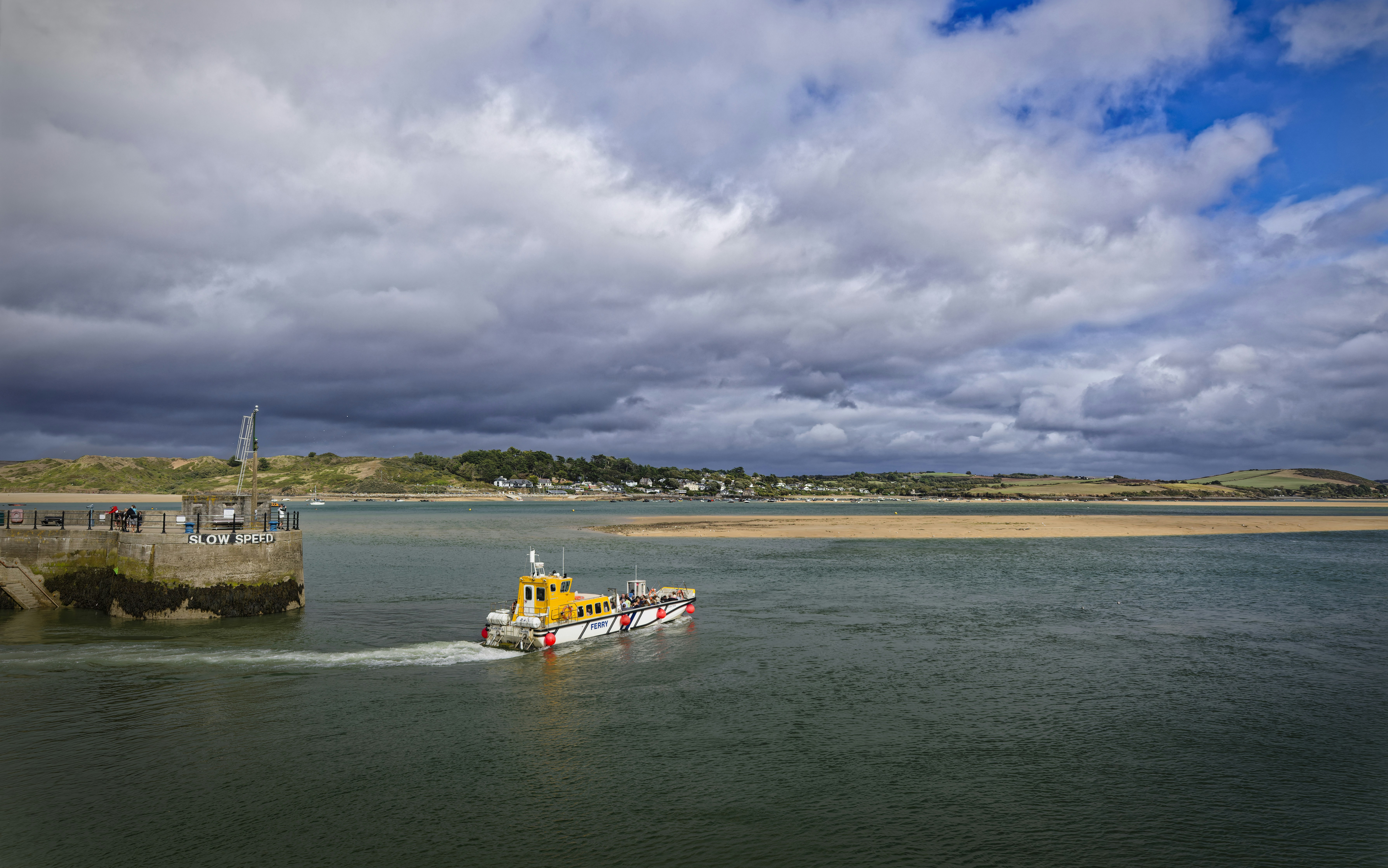 Yellow Boat Currents the Wider Sea