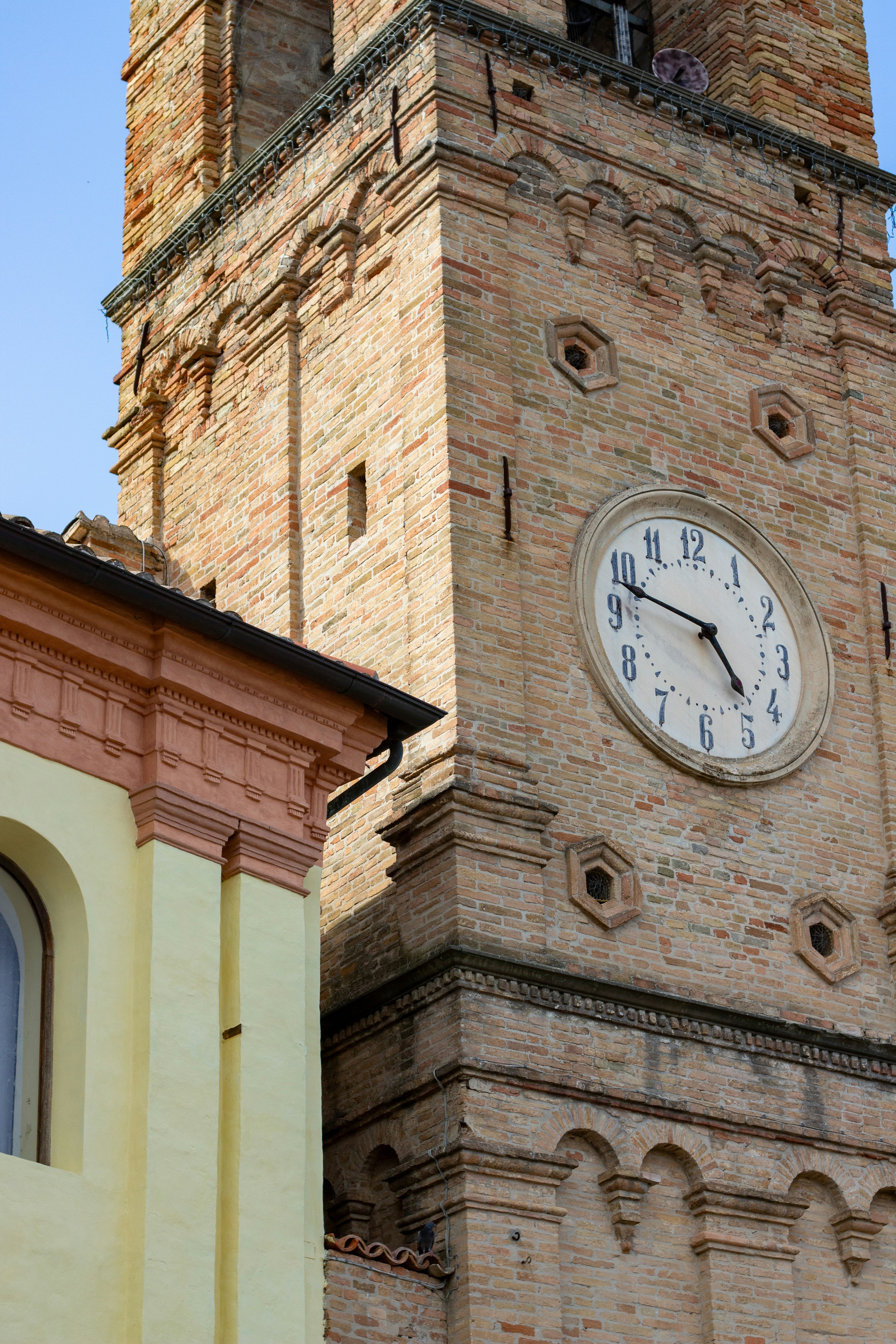 Clock Tower in Sunlit Brickwork