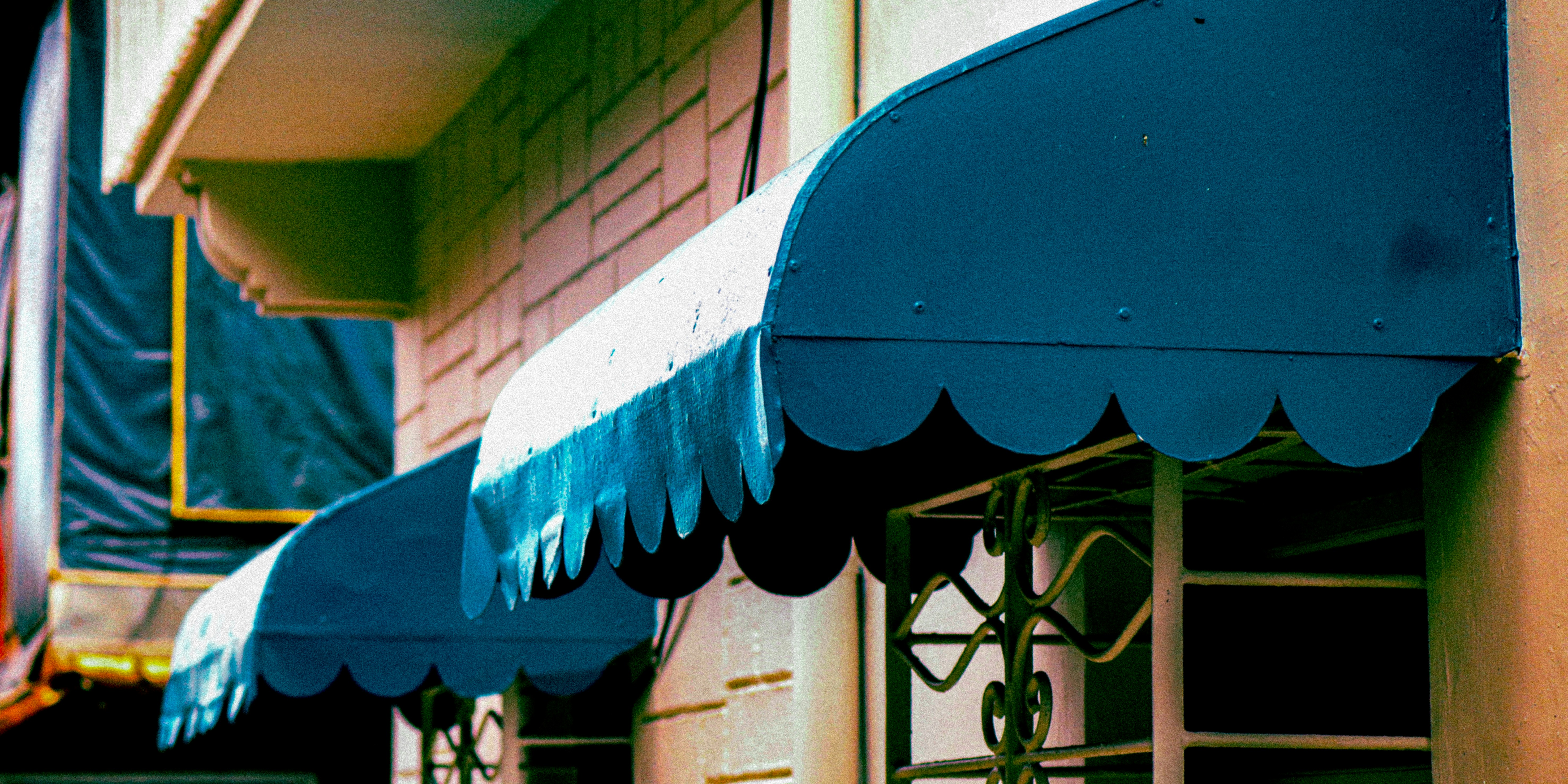 Blue Canopy Echoes: A Quiet Corner of a Street Market