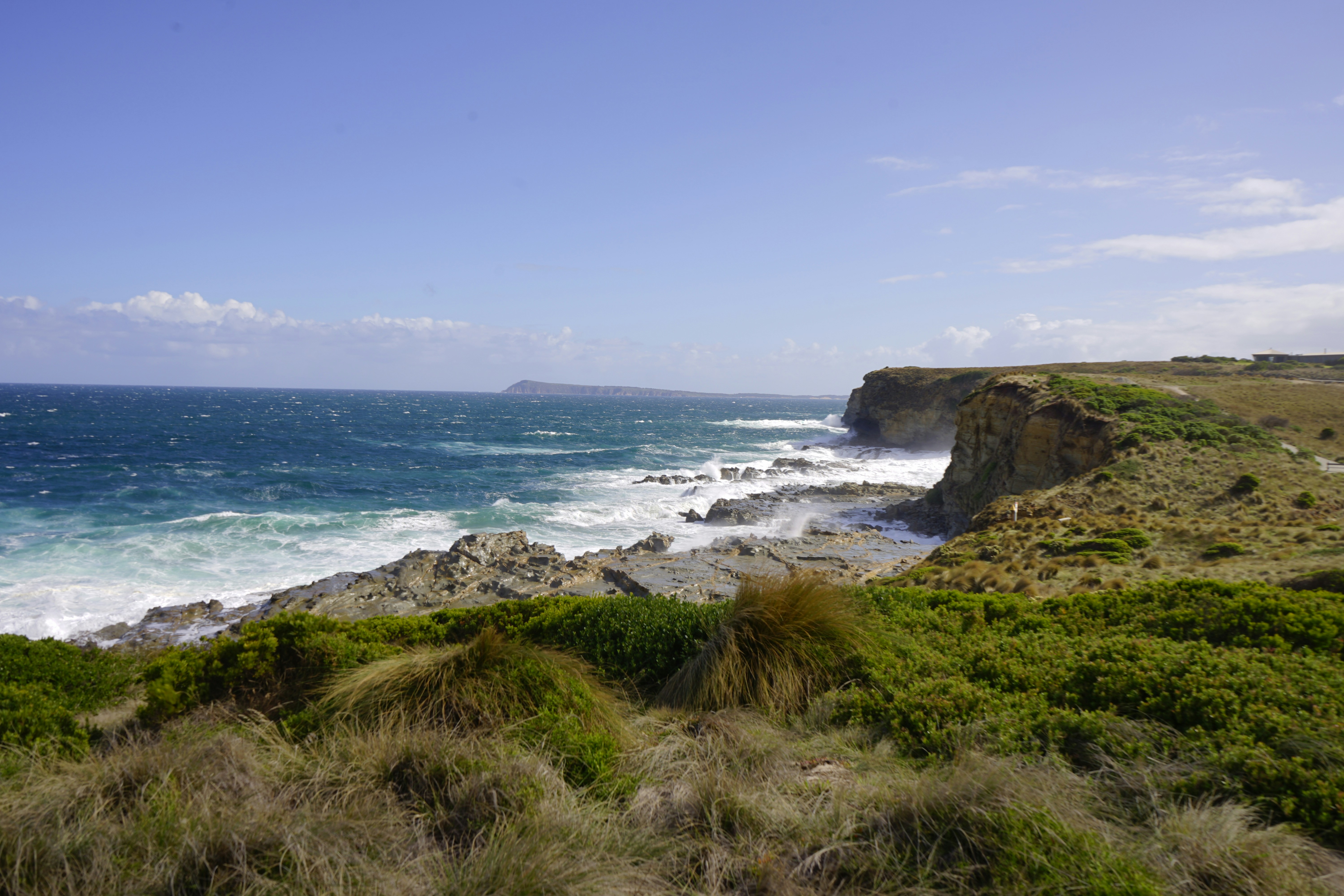 Edge of the World: Clifftop Horizon Over Turquoise Atlantic