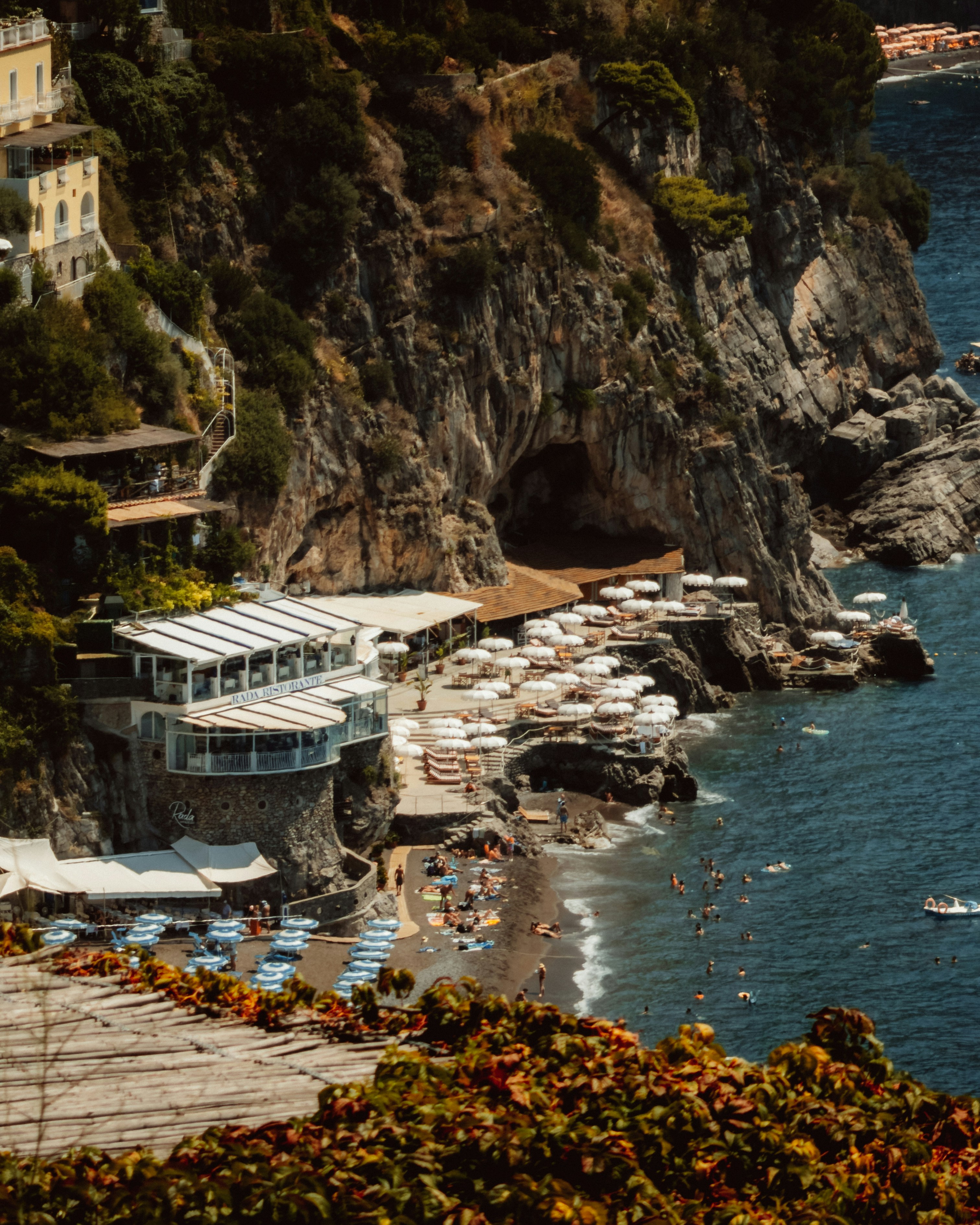 Cliffside Beachfront CaféNestled along rugged Ligurian cliffs