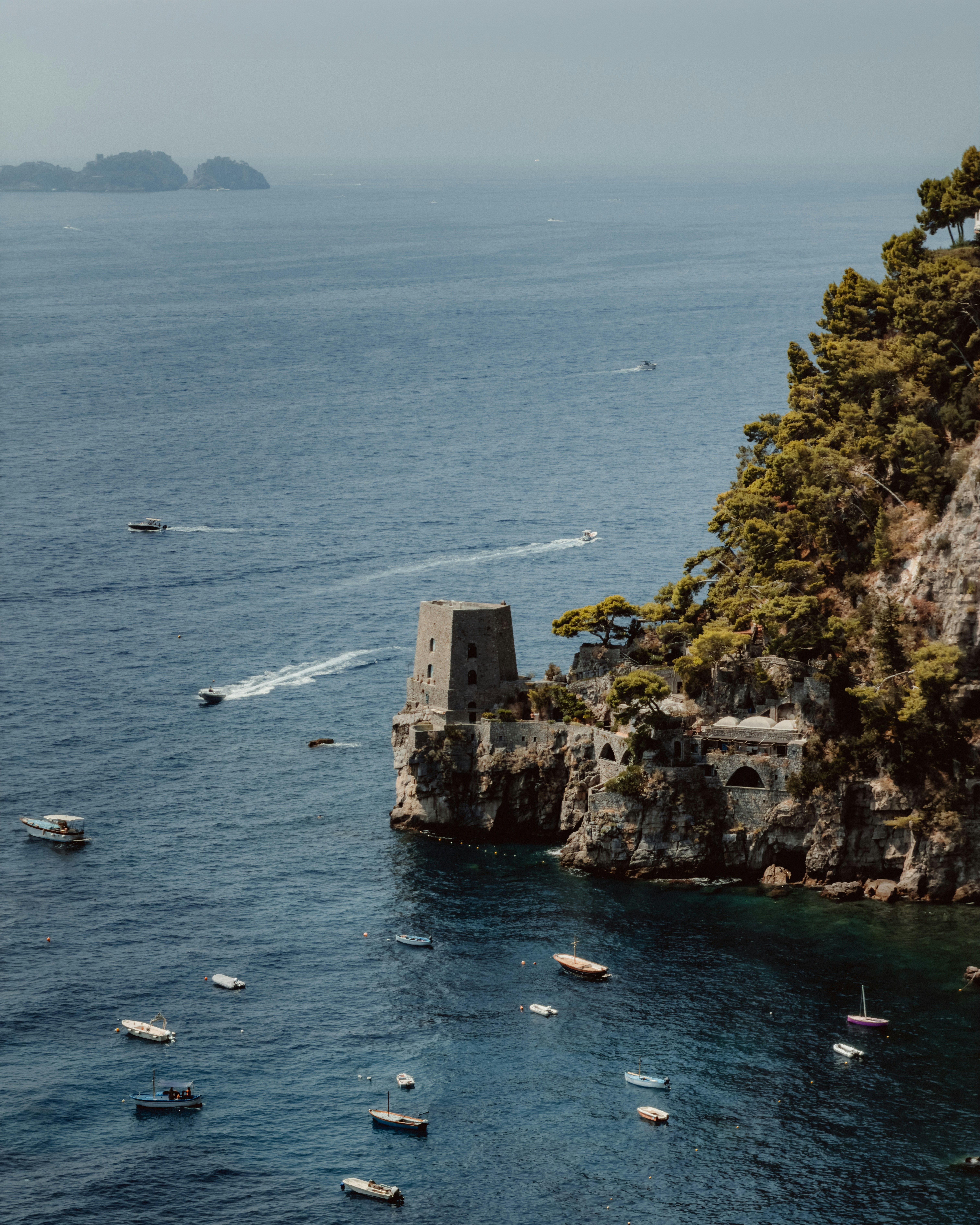 Fortress at Sea: A Quiet Cove Crowned by Pine and Stone