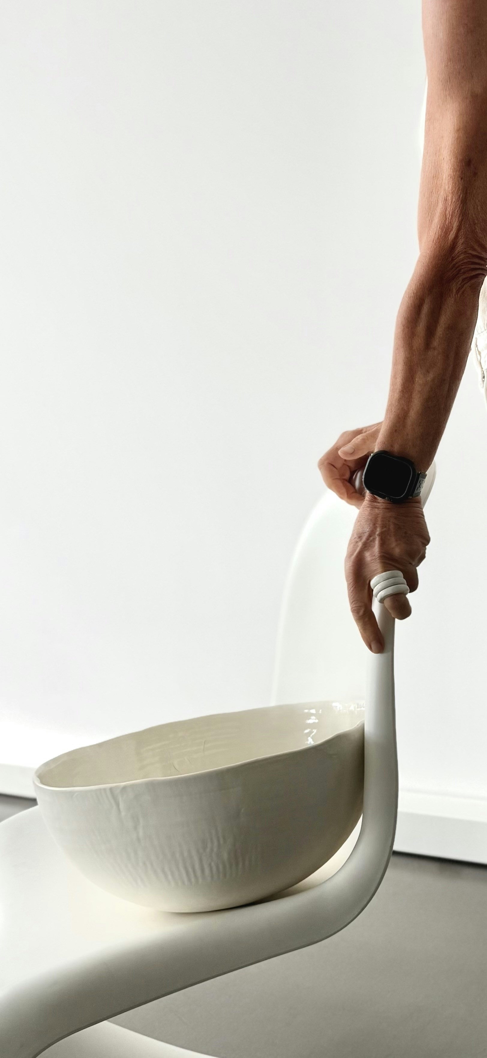 Grip and Grace: The Moment the Hand Secures the Bowl