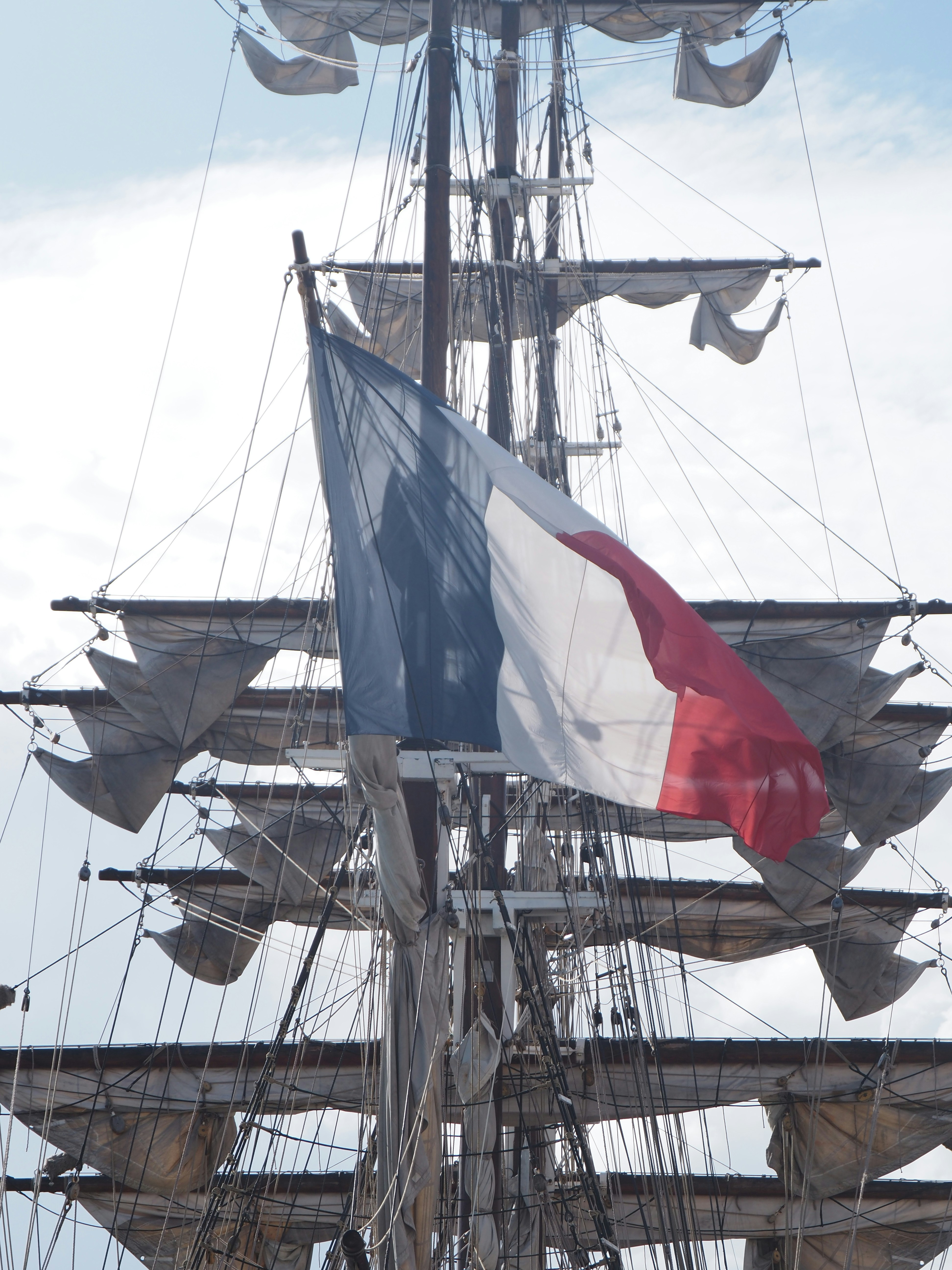 French Tricolor on the Masts: Flag in the Rigging of a Historic Ship