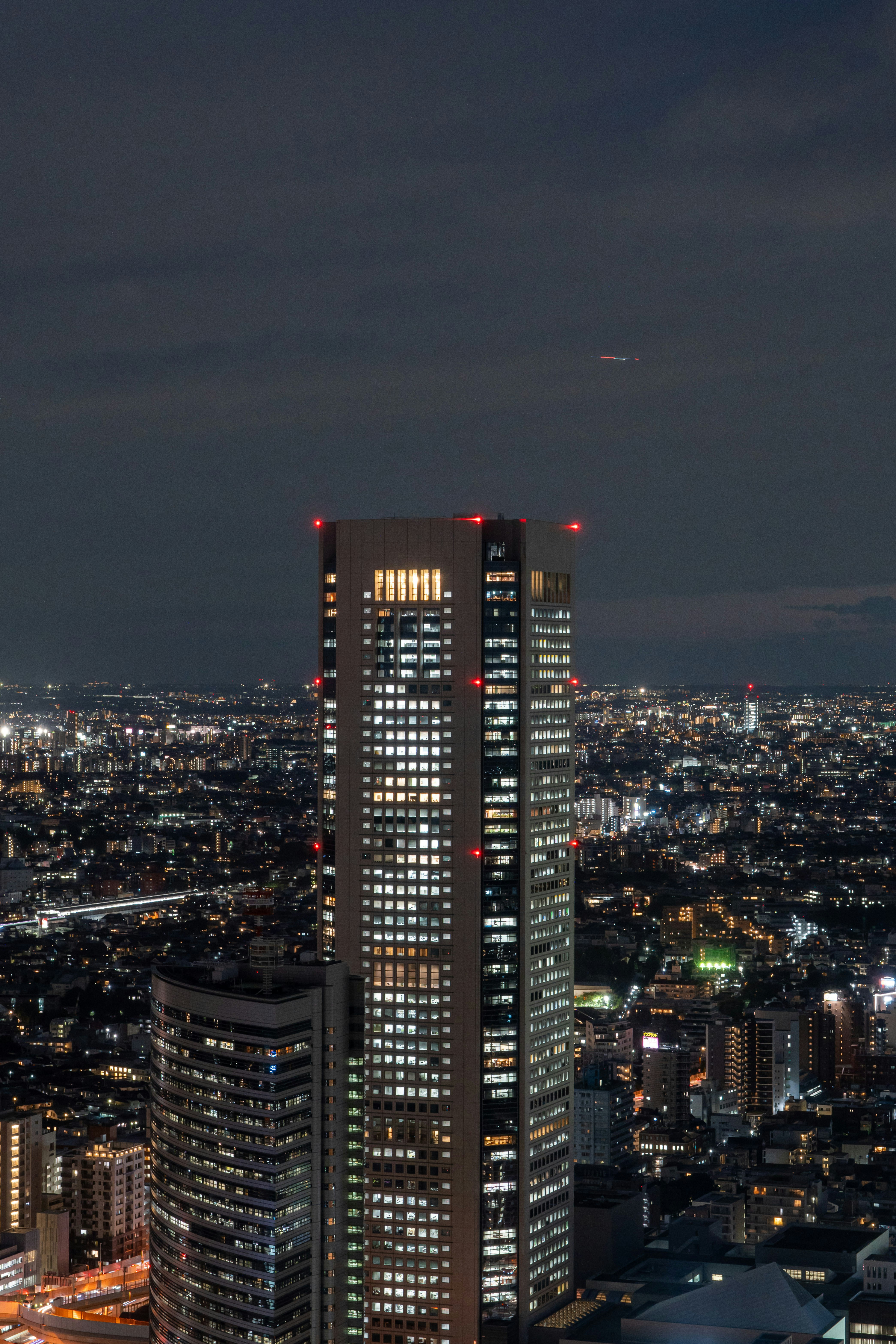 Night Apex: Twin-Tower Beacon Piercing the Skyline