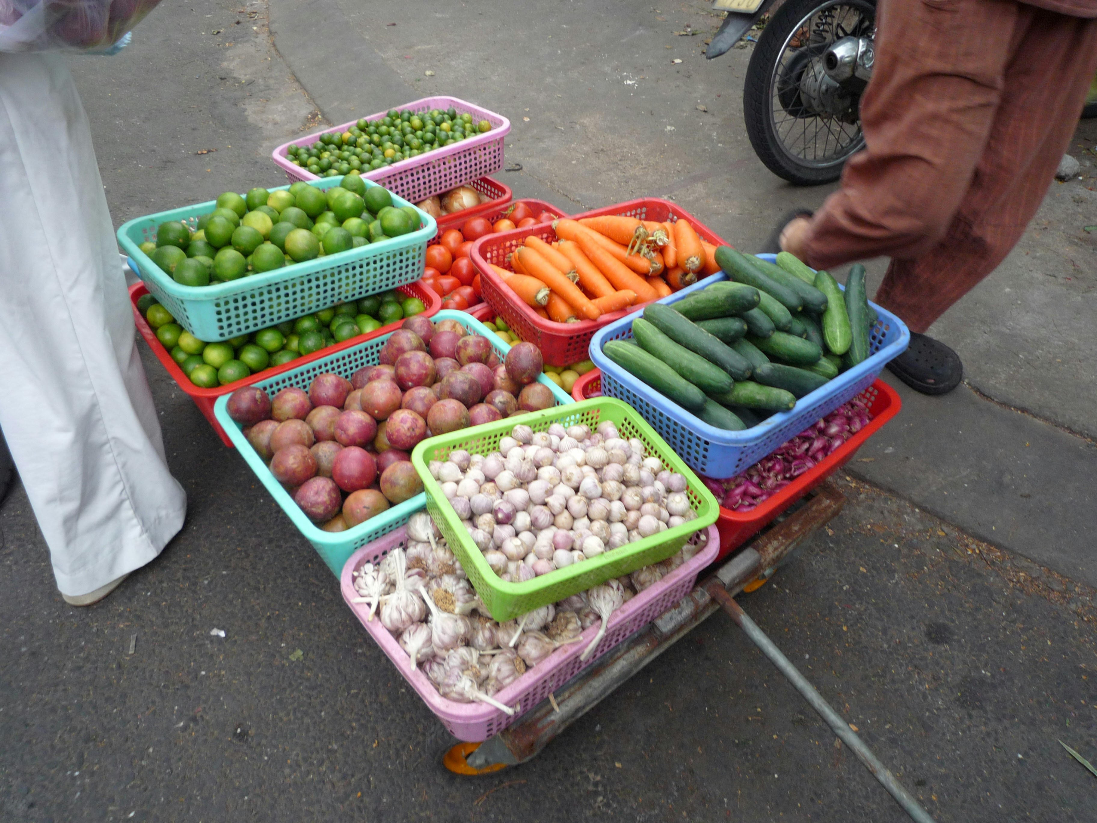 Colorful Market Basket: Fresh Produce on a Street Cart