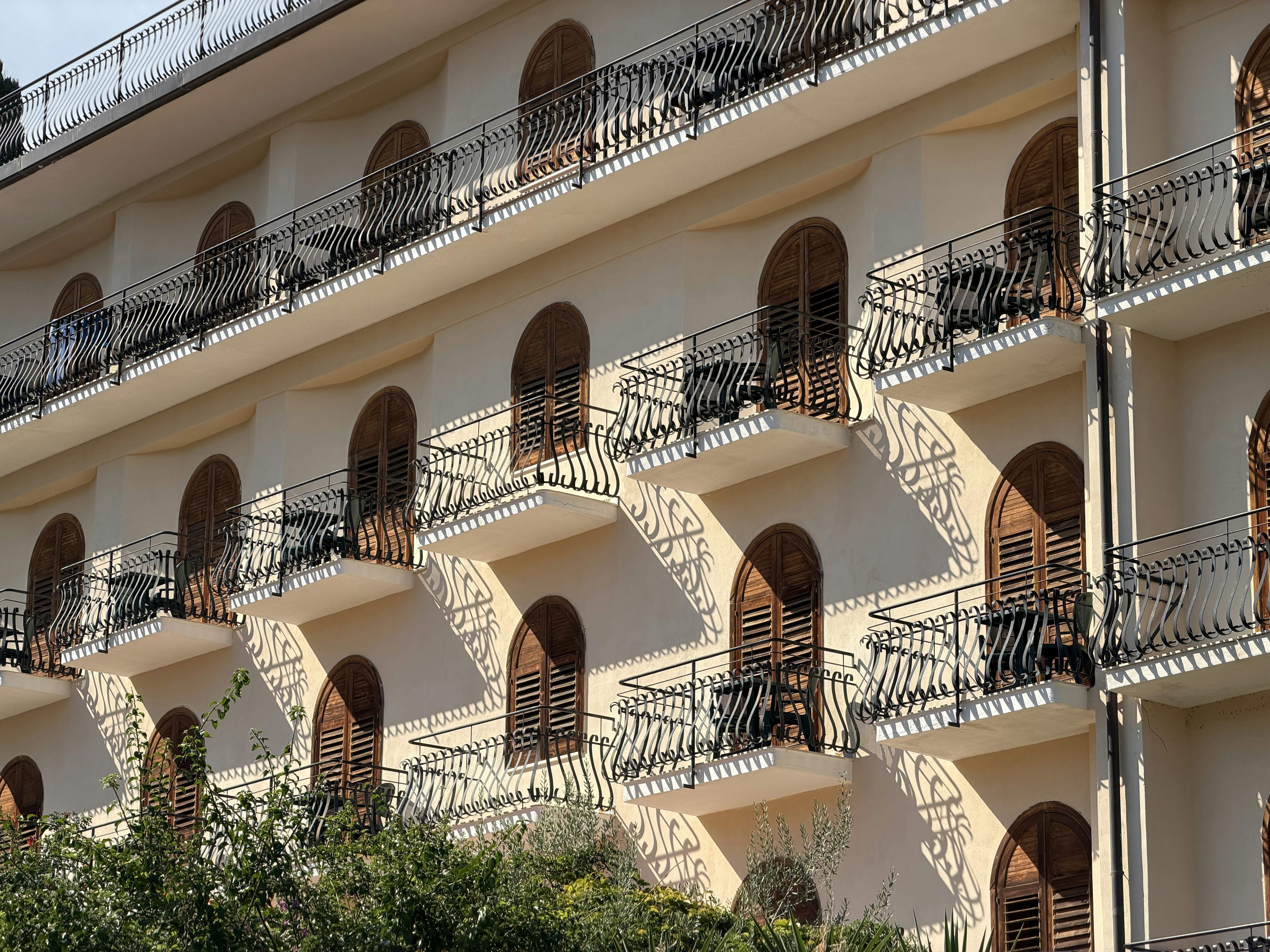 Balconies in Repetition: Shadowplay on a Mediterranean Facade