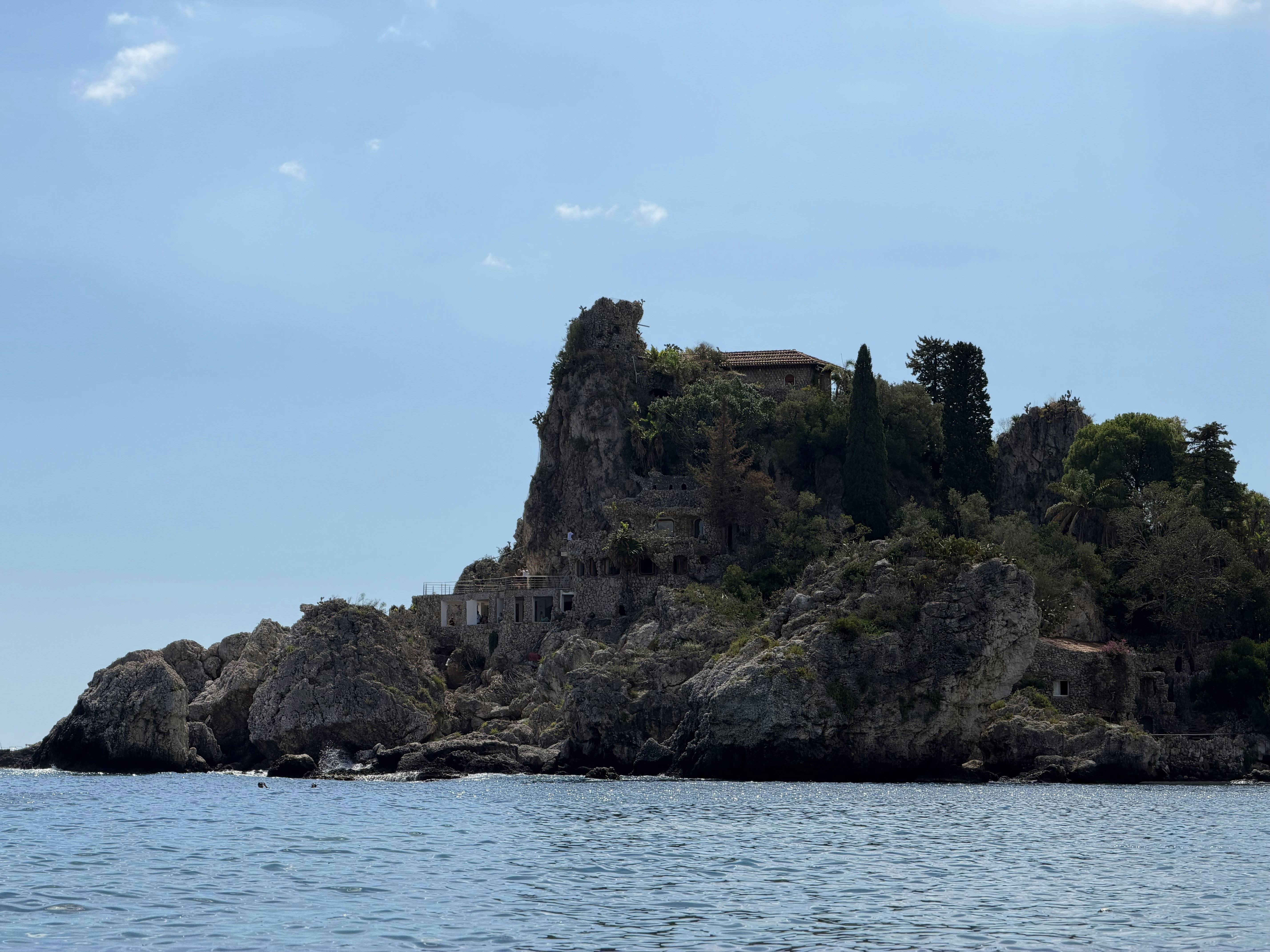 Castle on the Cliff: A Mediterranean Islet Above the Quiet Sea