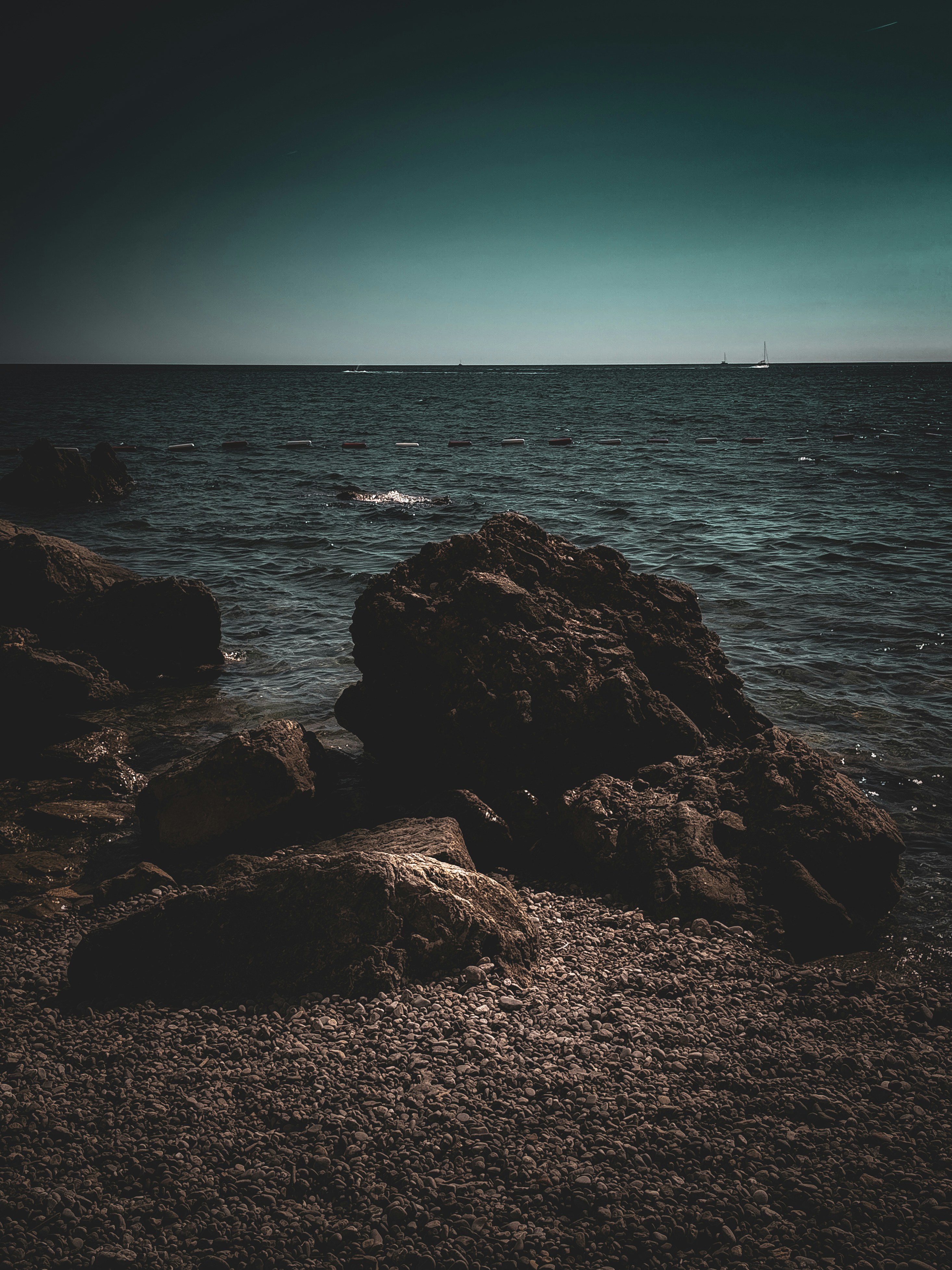 Coastal Rocks at Dusk: A Quiet Line Between Sea and Sky