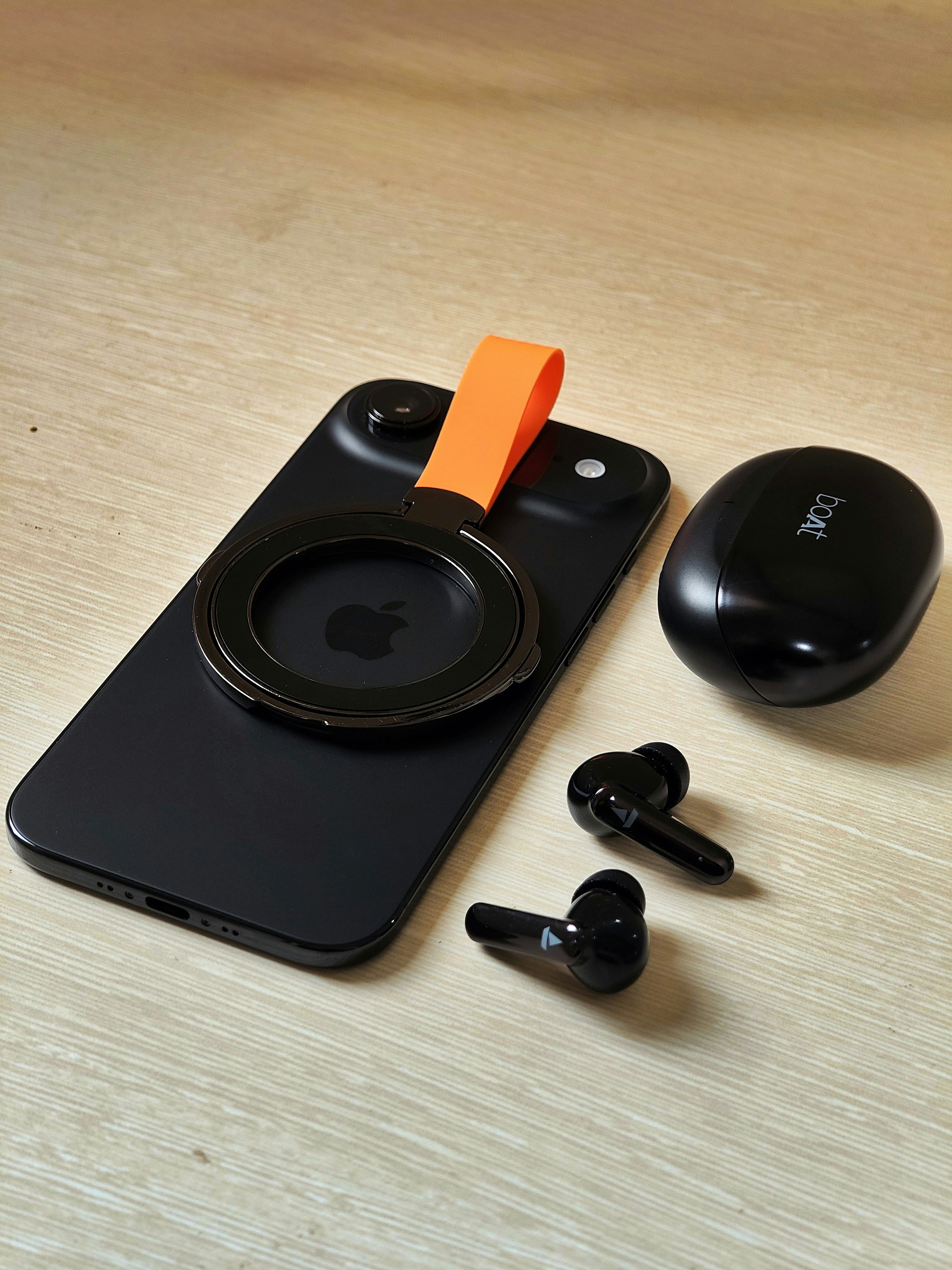 Magnetic Gear: Nothing Phone 3a Pro with Wireless Earbuds at Rest