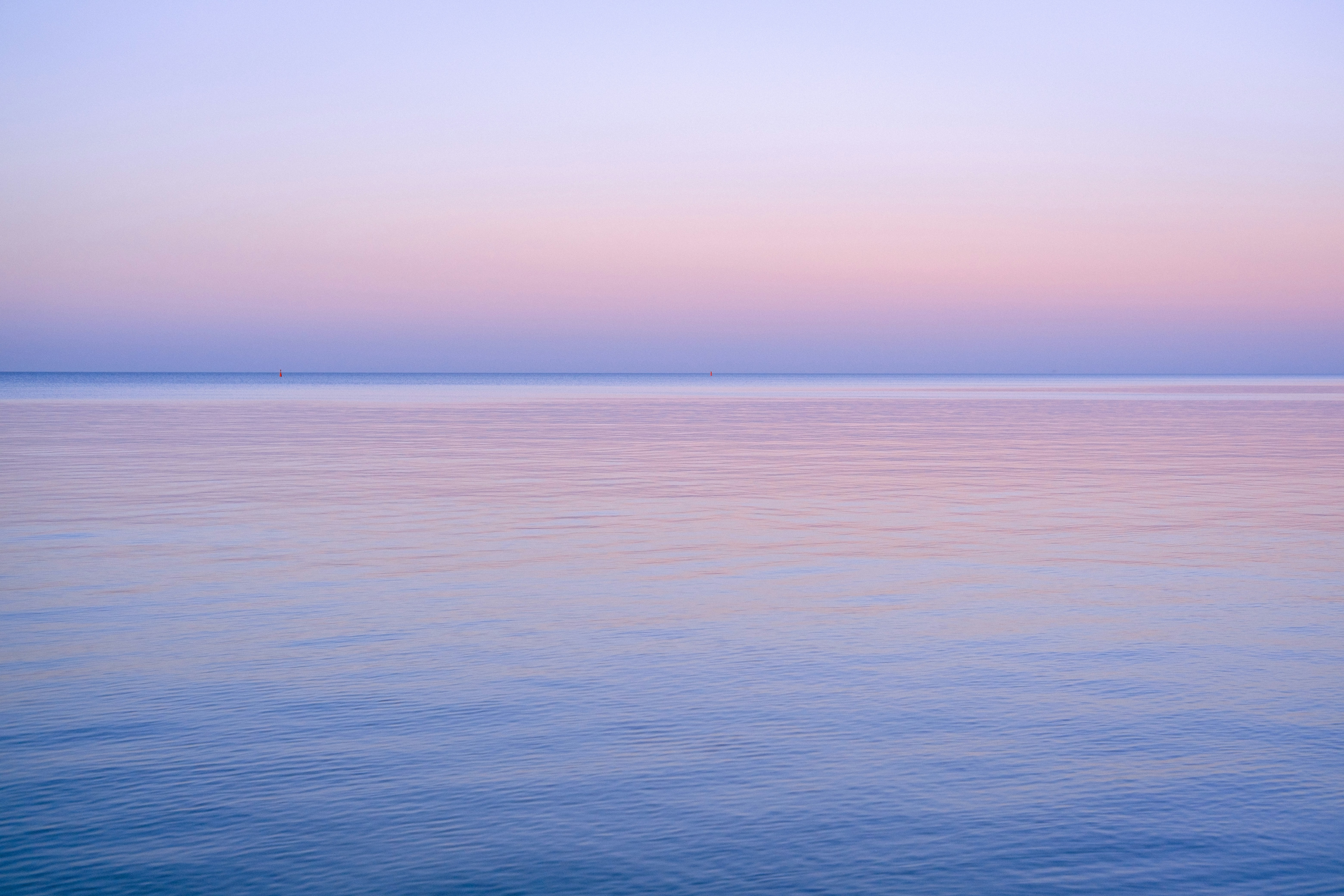 Pastel Horizon Over Calm Waters