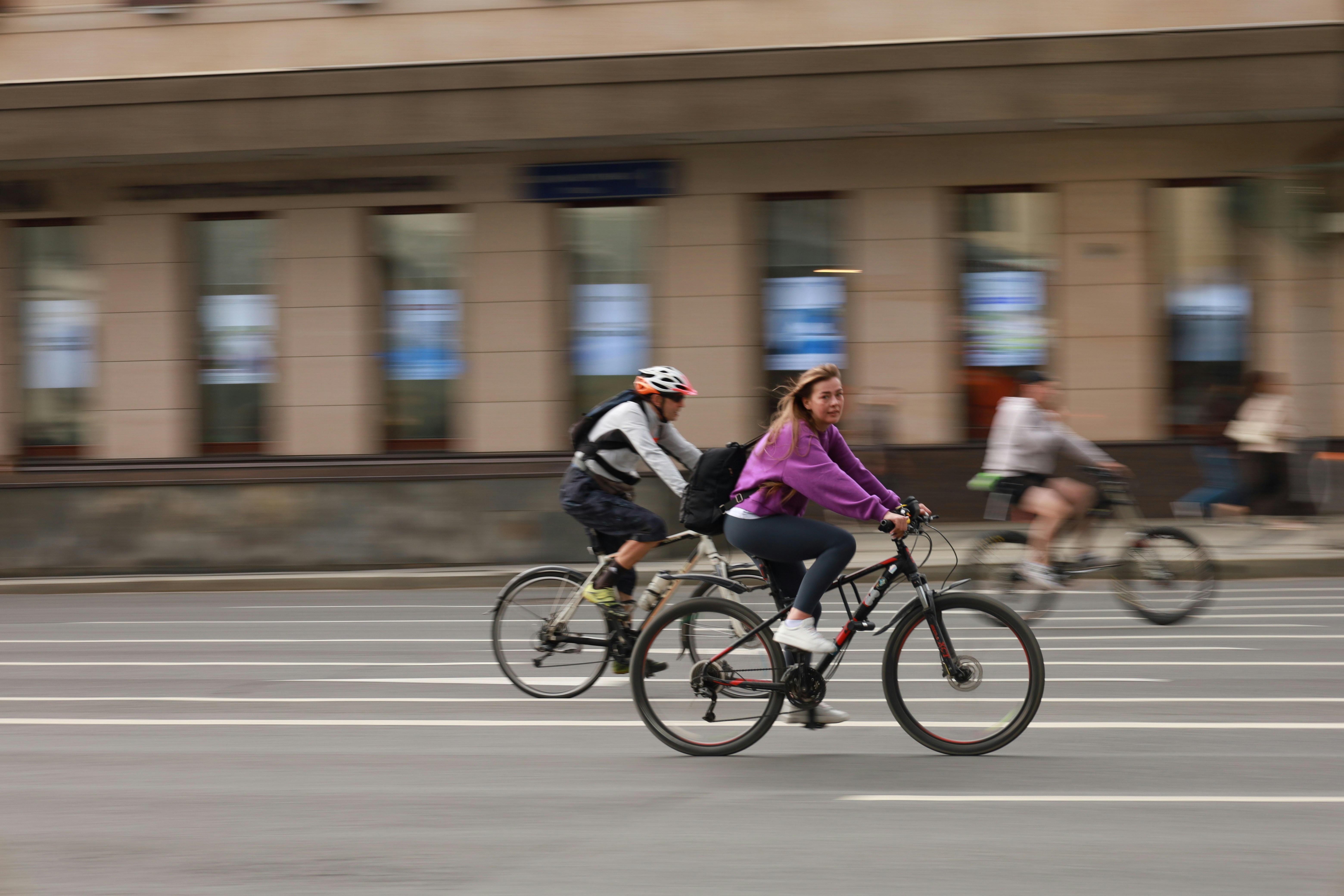 Pedal Parade: Cyclists in Motion through a City Square
