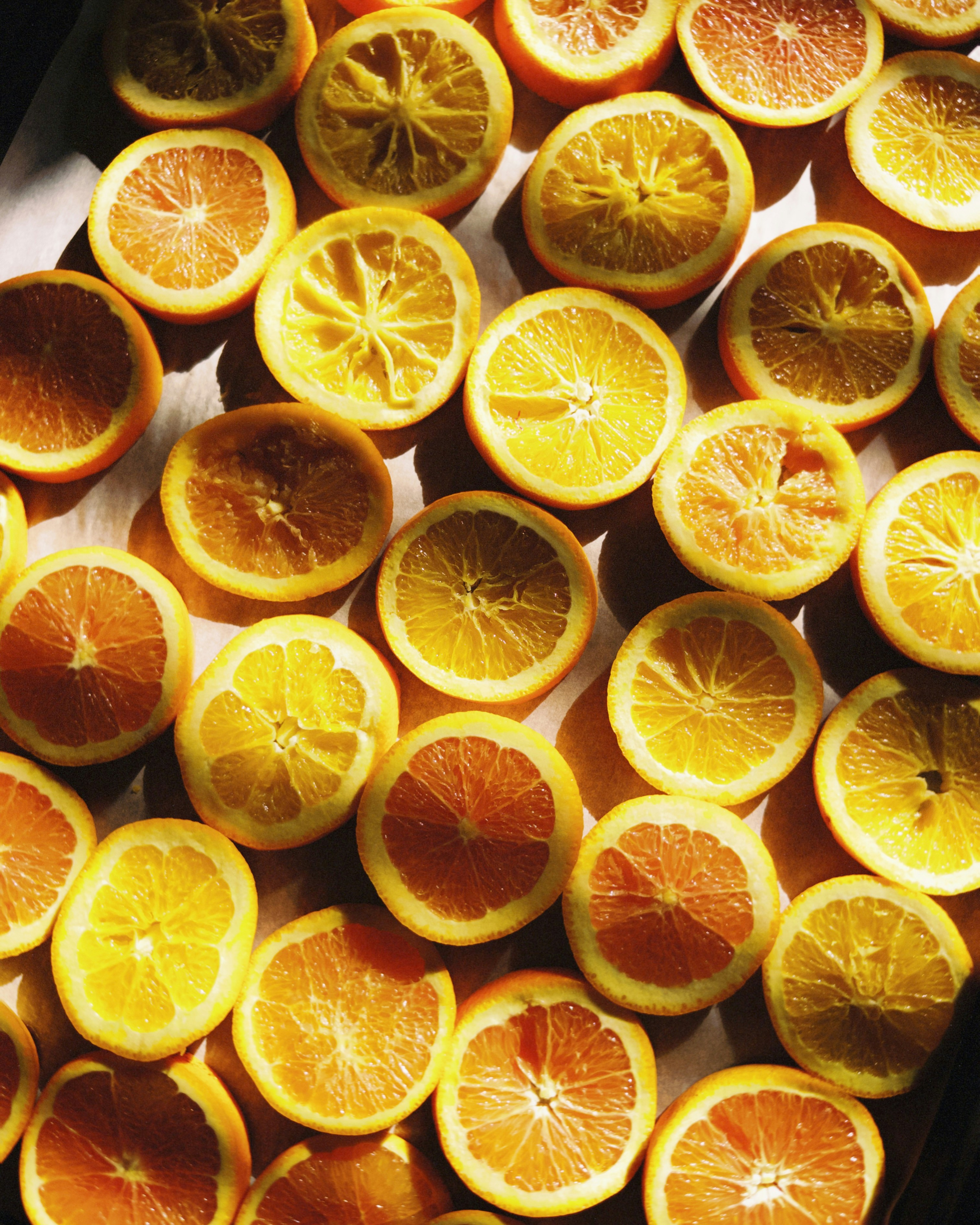 Citrus Mosaic: A Sunlit Tray of Halved Oranges