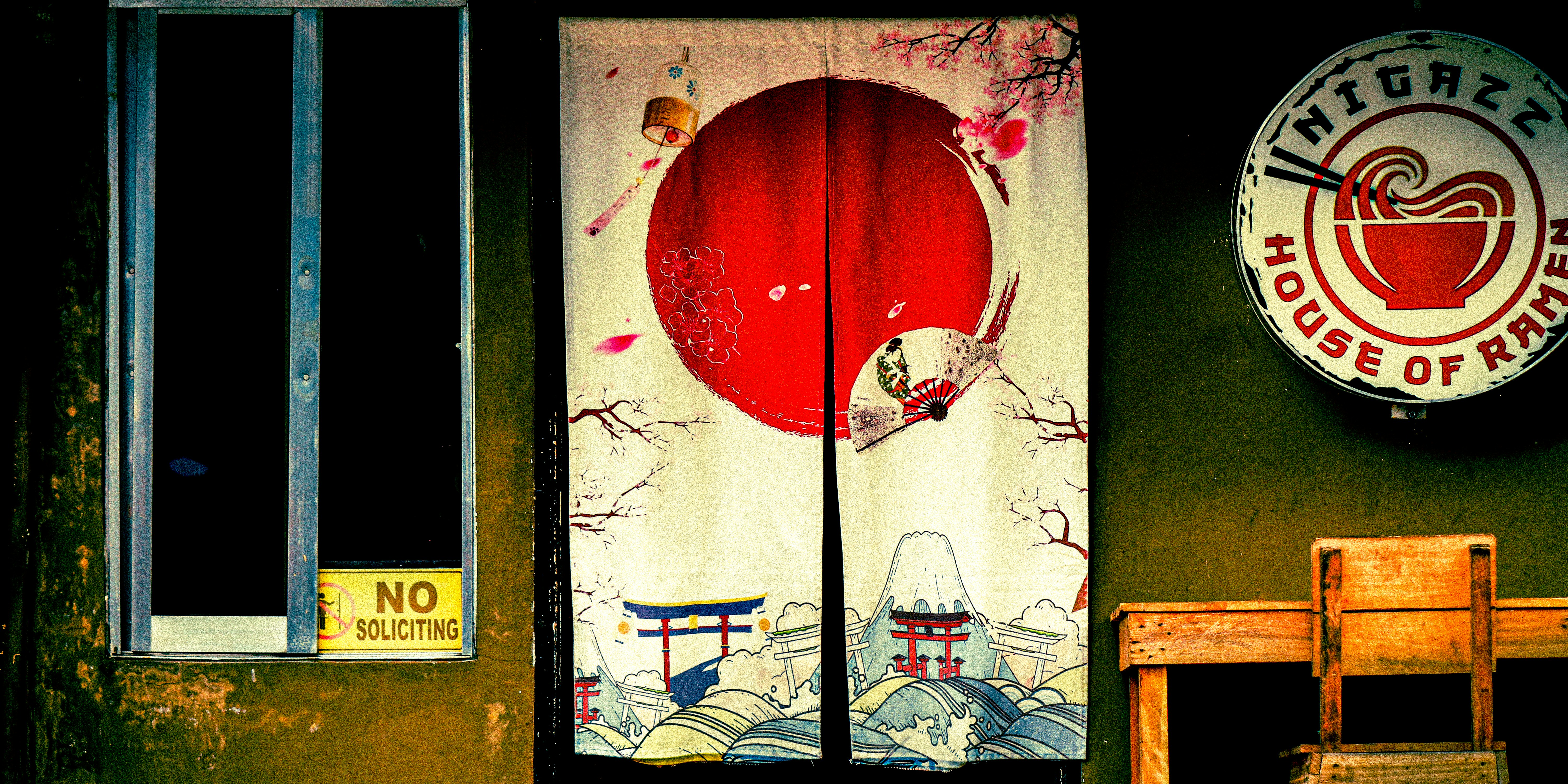 Red Sun Banner Beneath a Quiet Entrance
