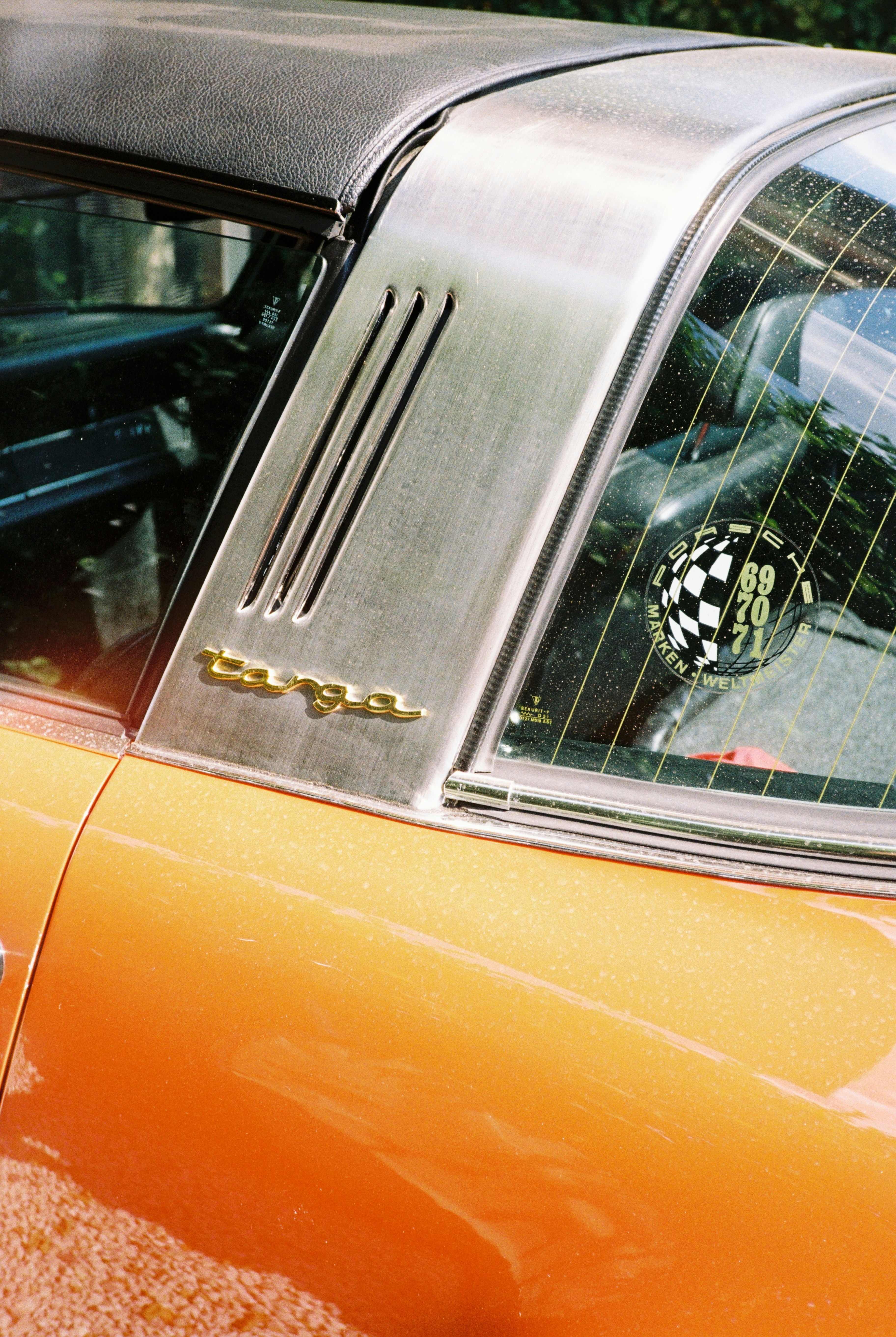 Chrome Cloak: The Targa's Metallic Sunset