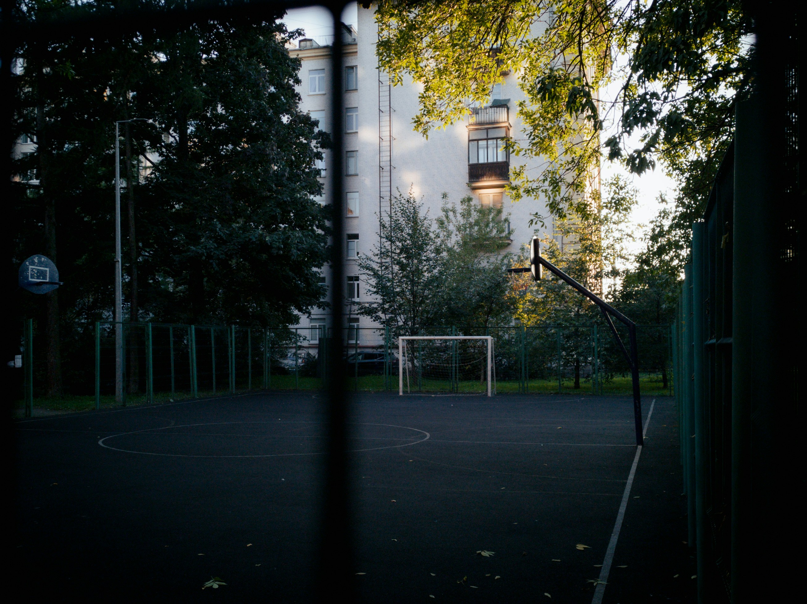 Silent Goalpost at Dusk: A Quiet Schoolyard Scene