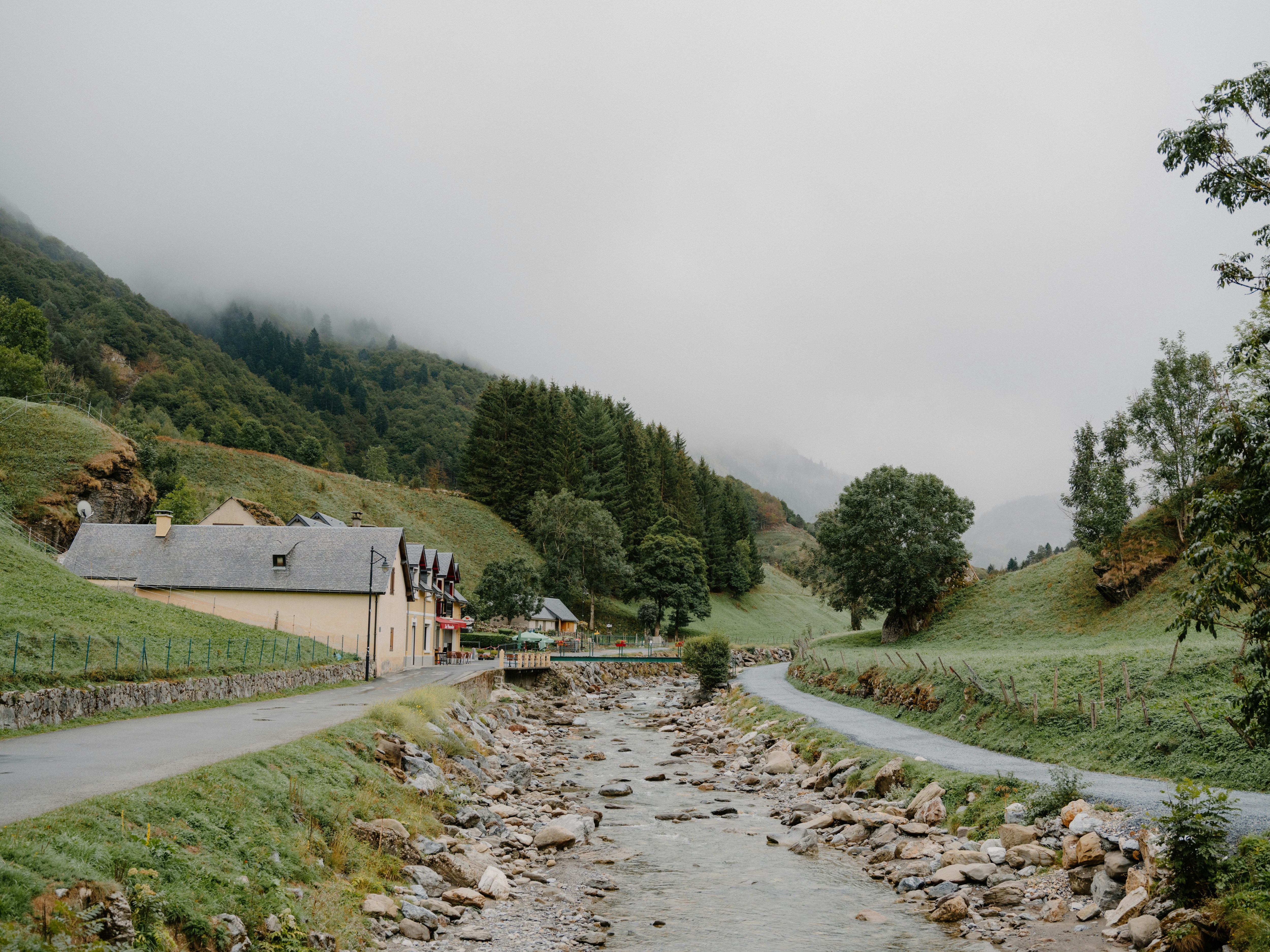 Valley Stream Village Under Misty Hills