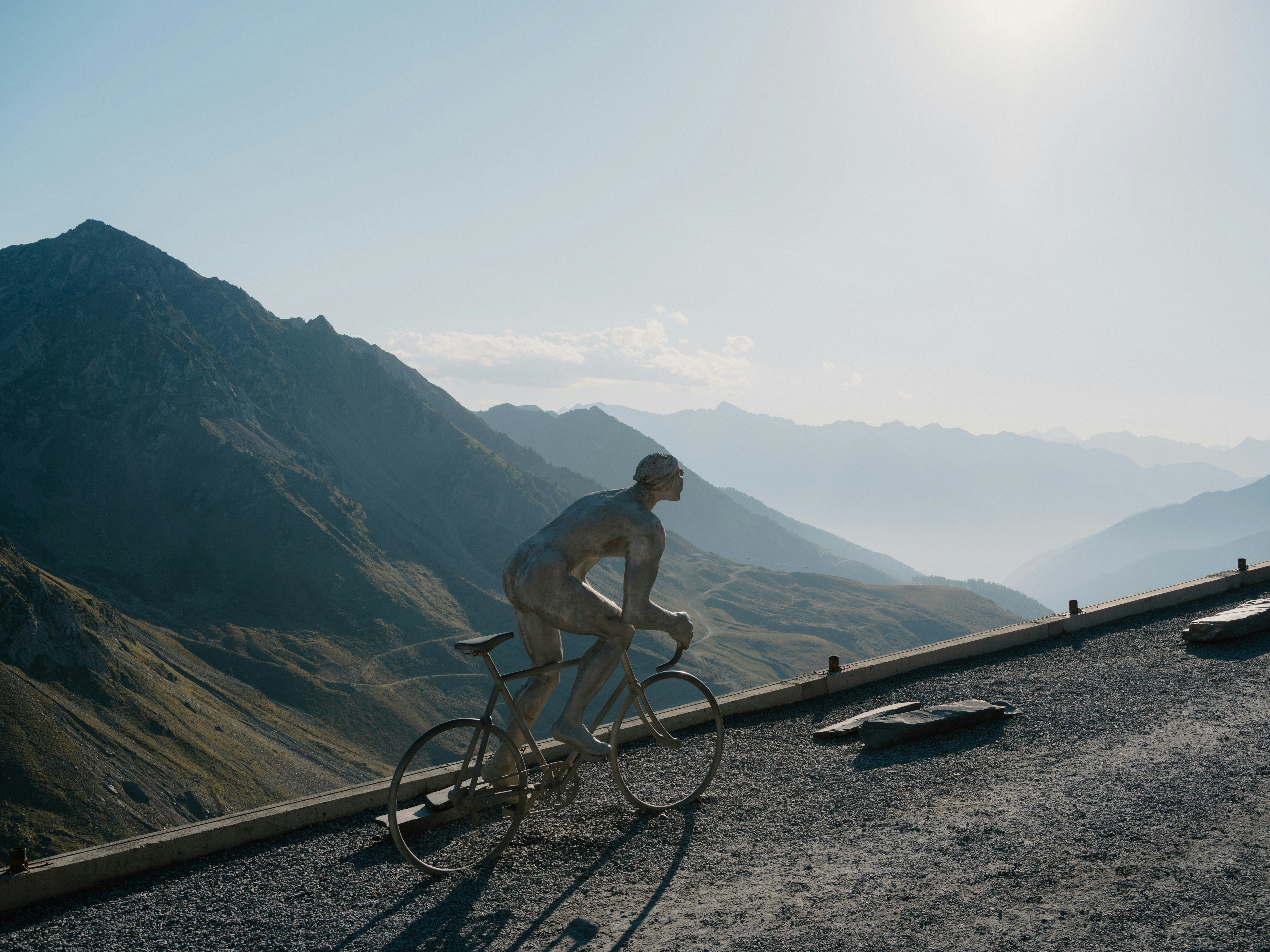 Ridge Ride: A Cyclist Holds Course Along a Mountain Pass