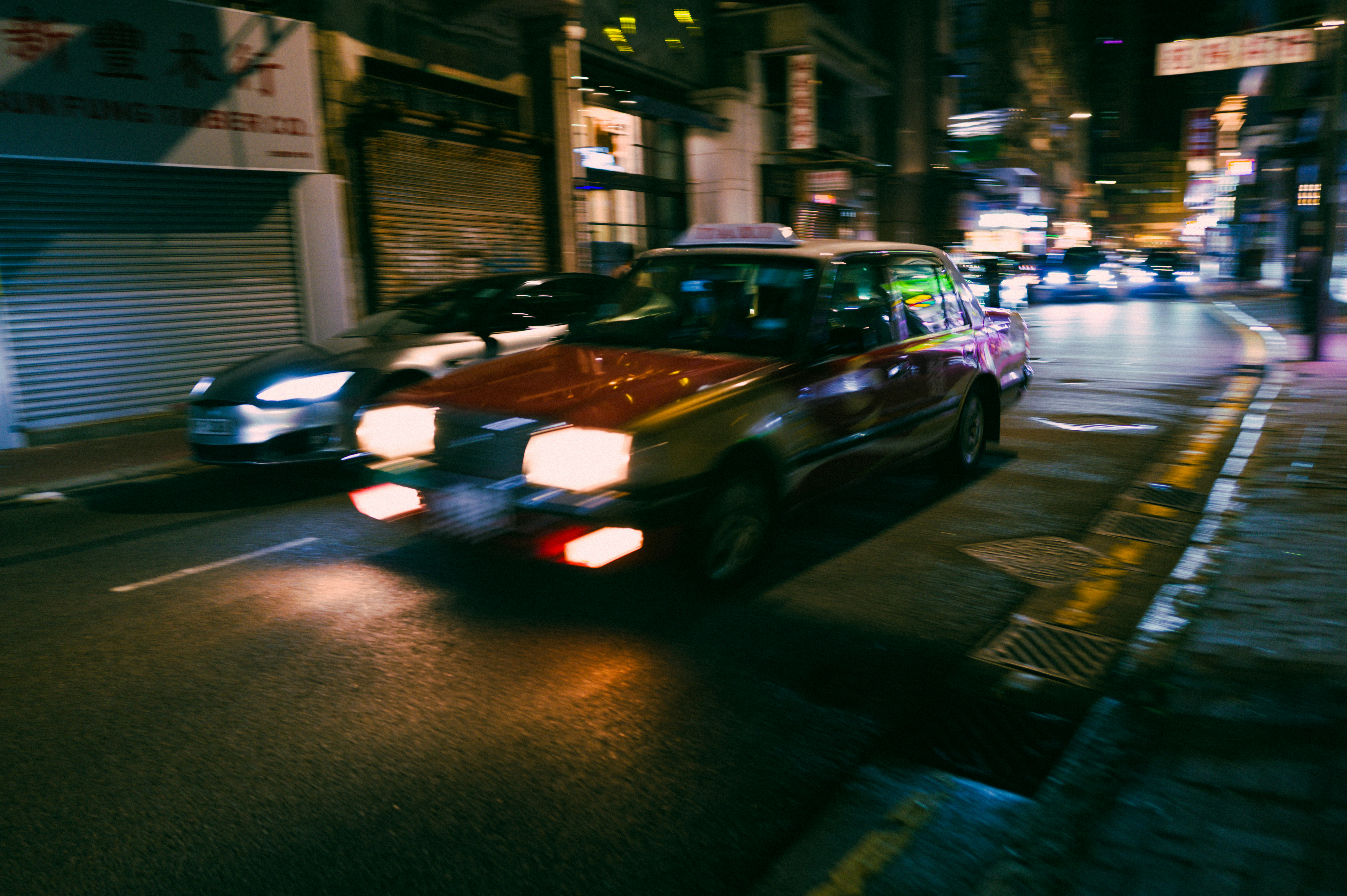 Night Street Taxi in Slow Blur
