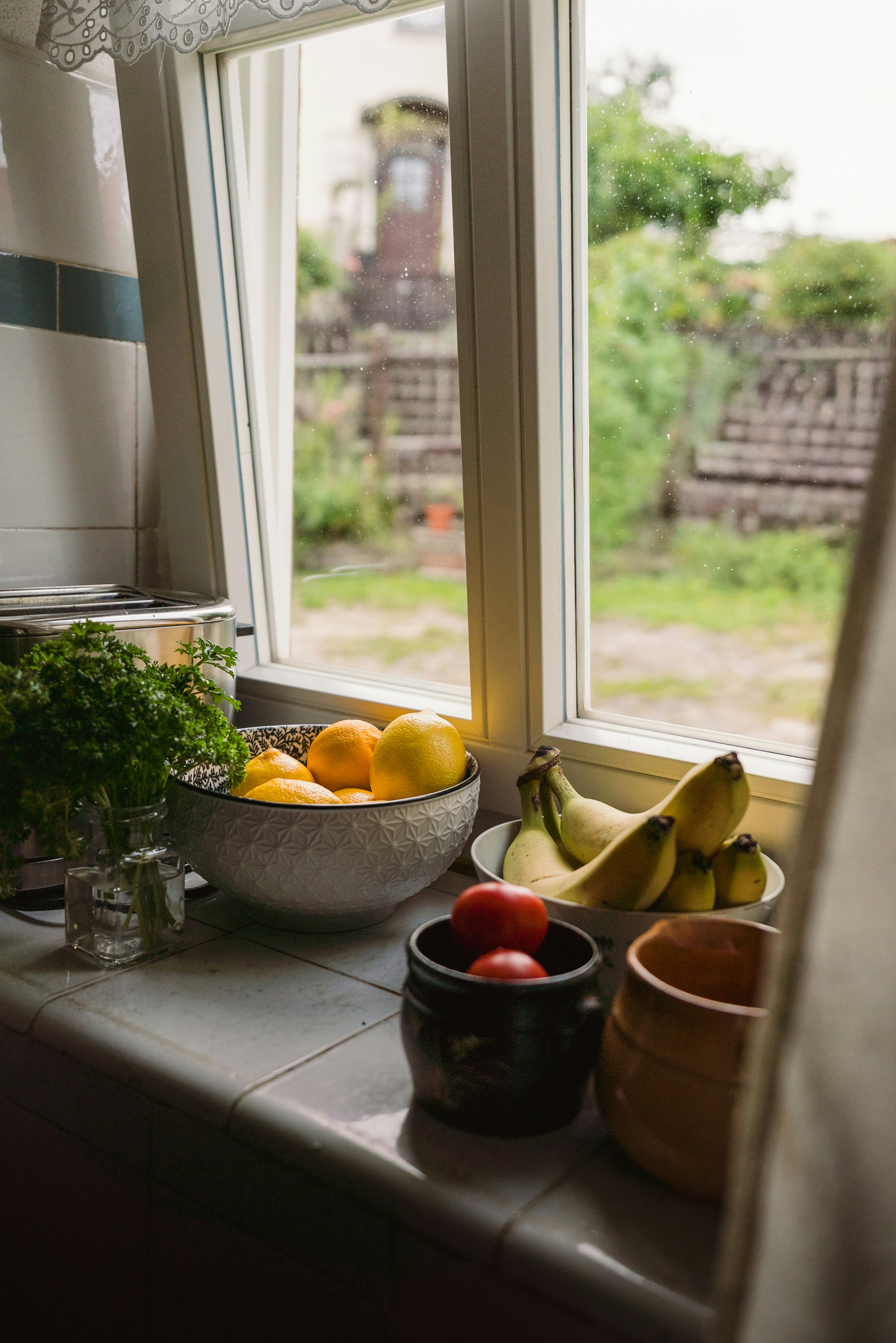 Fruit Bowl by the Window: Quiet Morning in the Kitchen