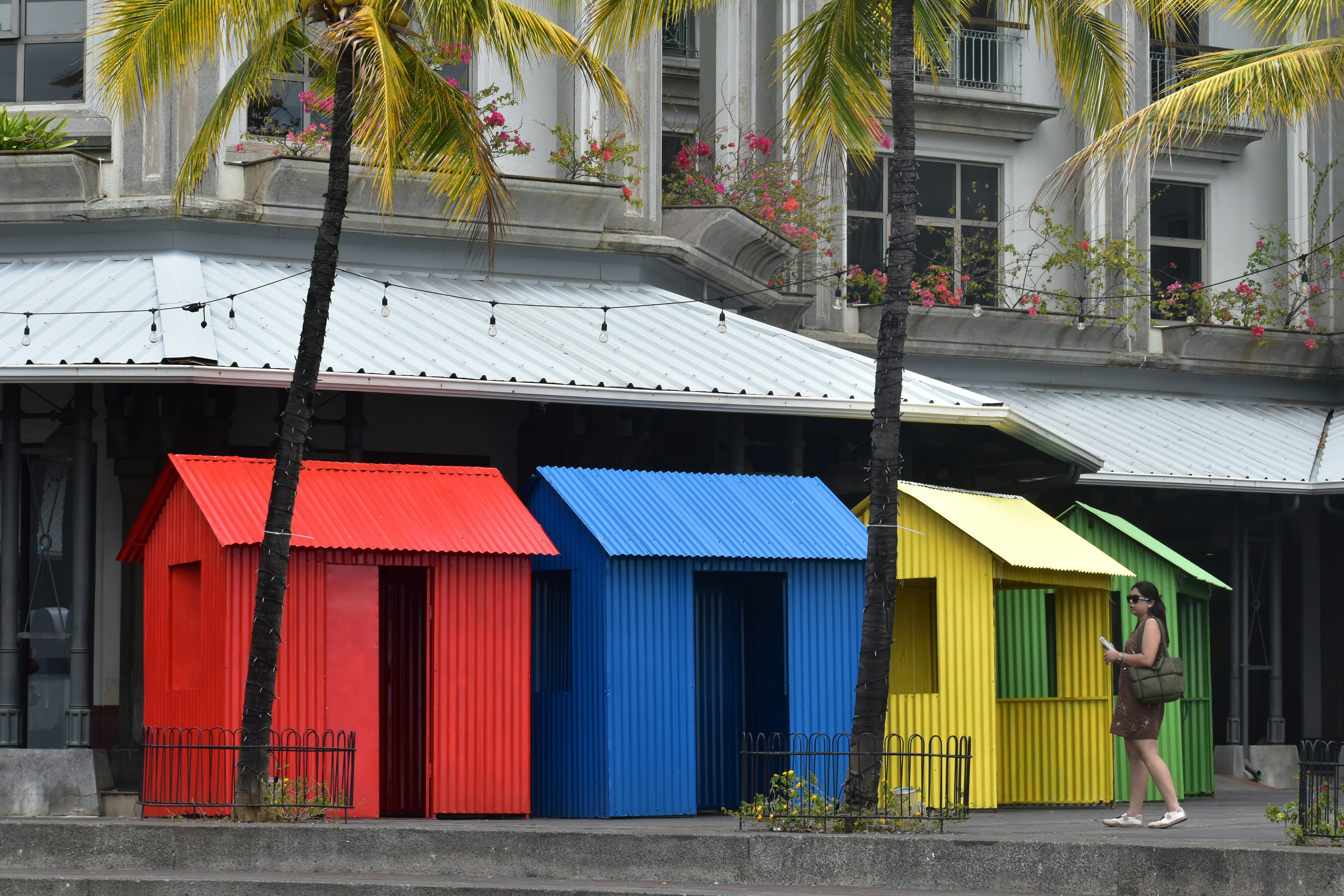 Colorful Boathouse Pods along a Sunny City Walk