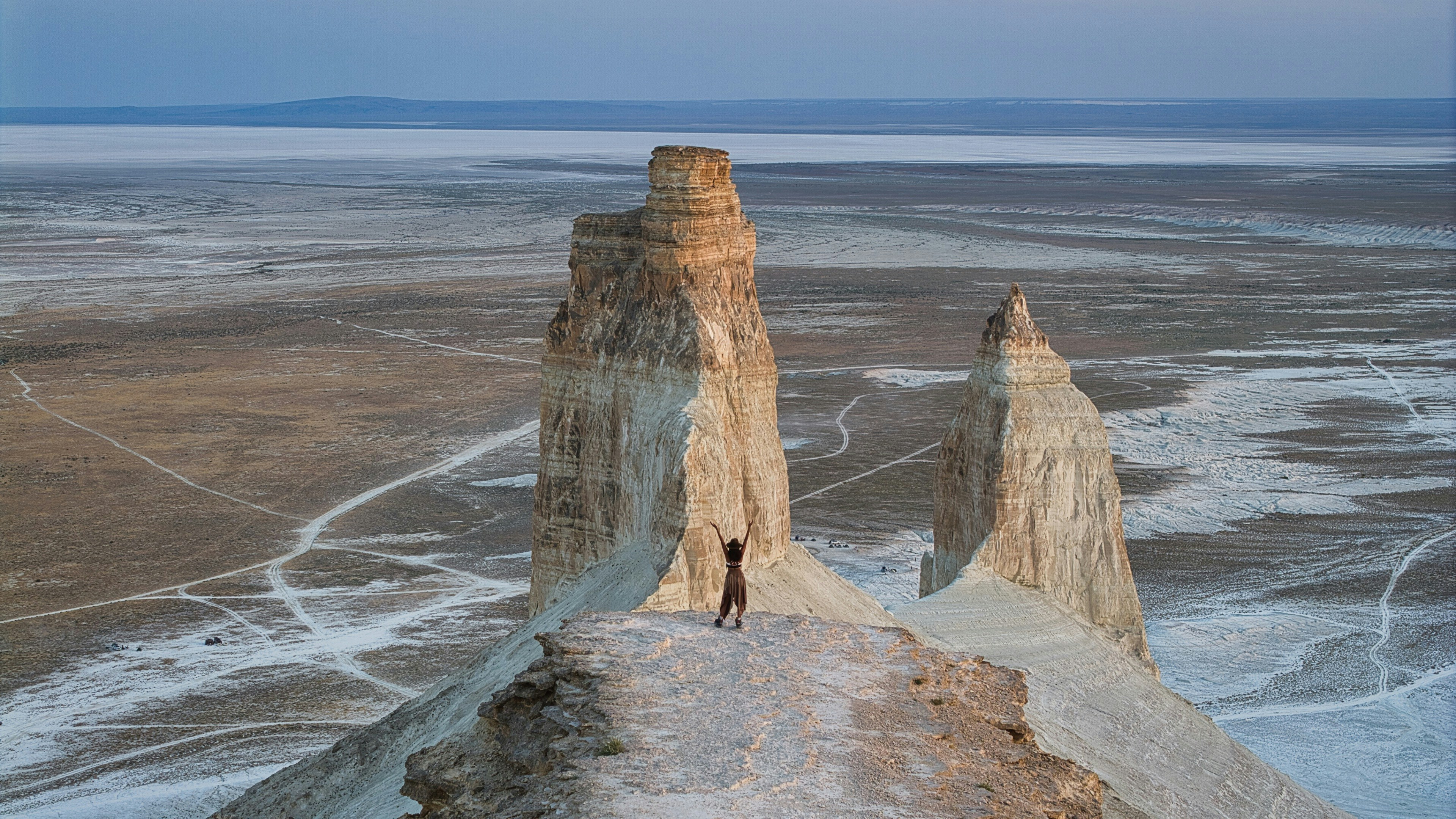 Twin Pillars at Distant Salt Flats