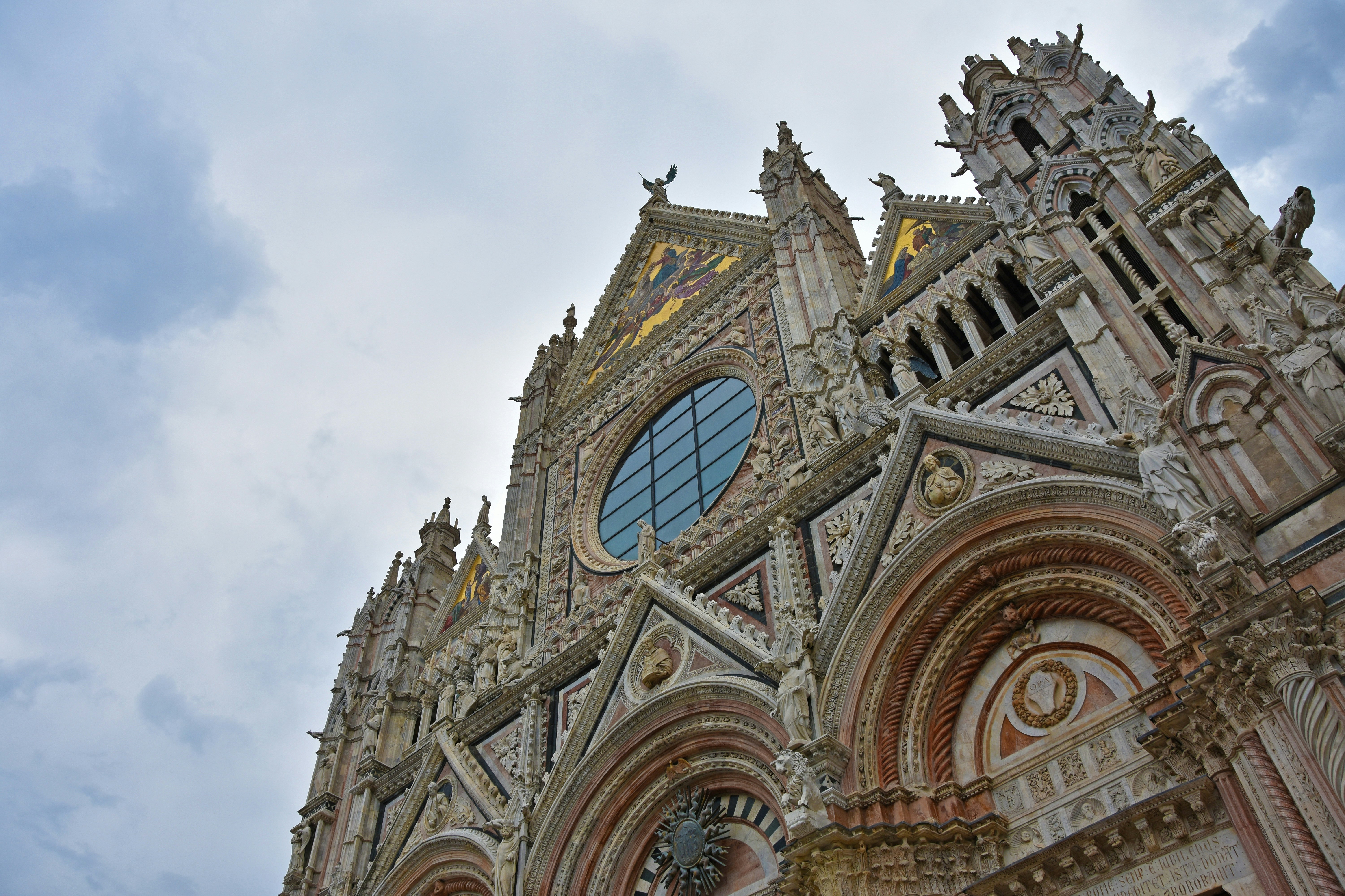 Gothic Facade in Focus: A Cathedral’s Ornate Rise Toward the Sky