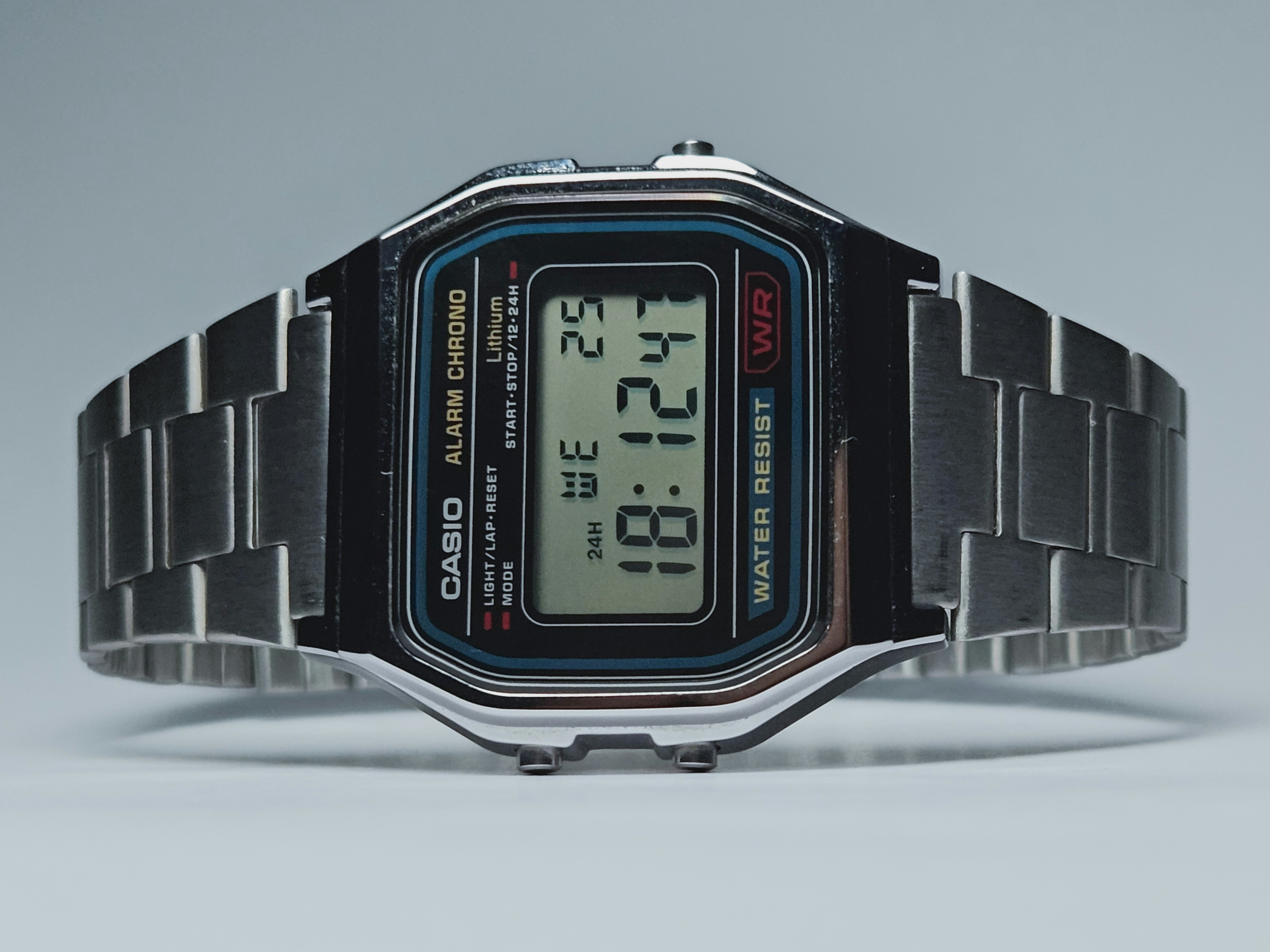 Stitched Time: A Casio Digital Wristwatch in Crisp Studio Light