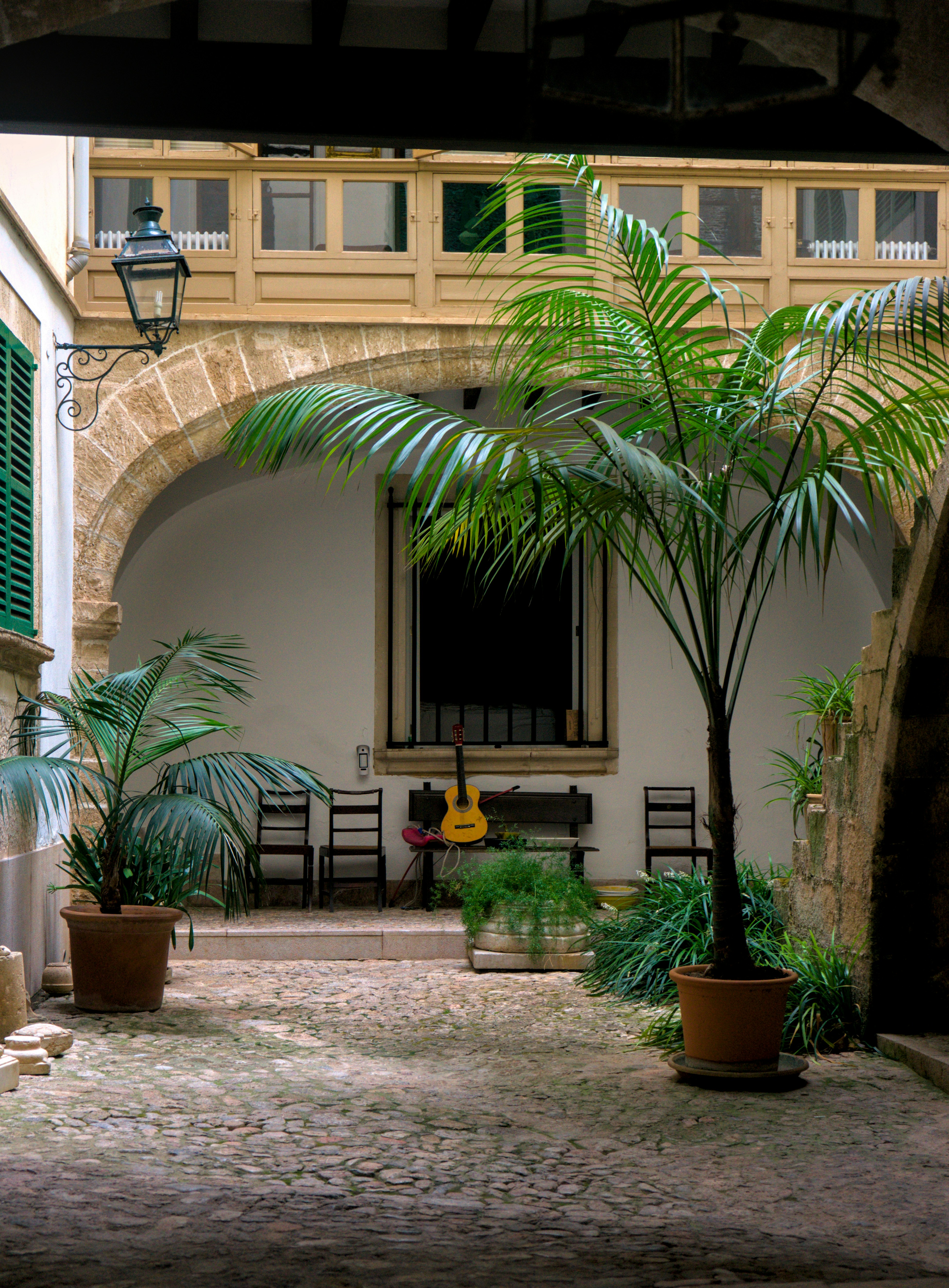Guitar Quiet in a Courtyard Oasis
