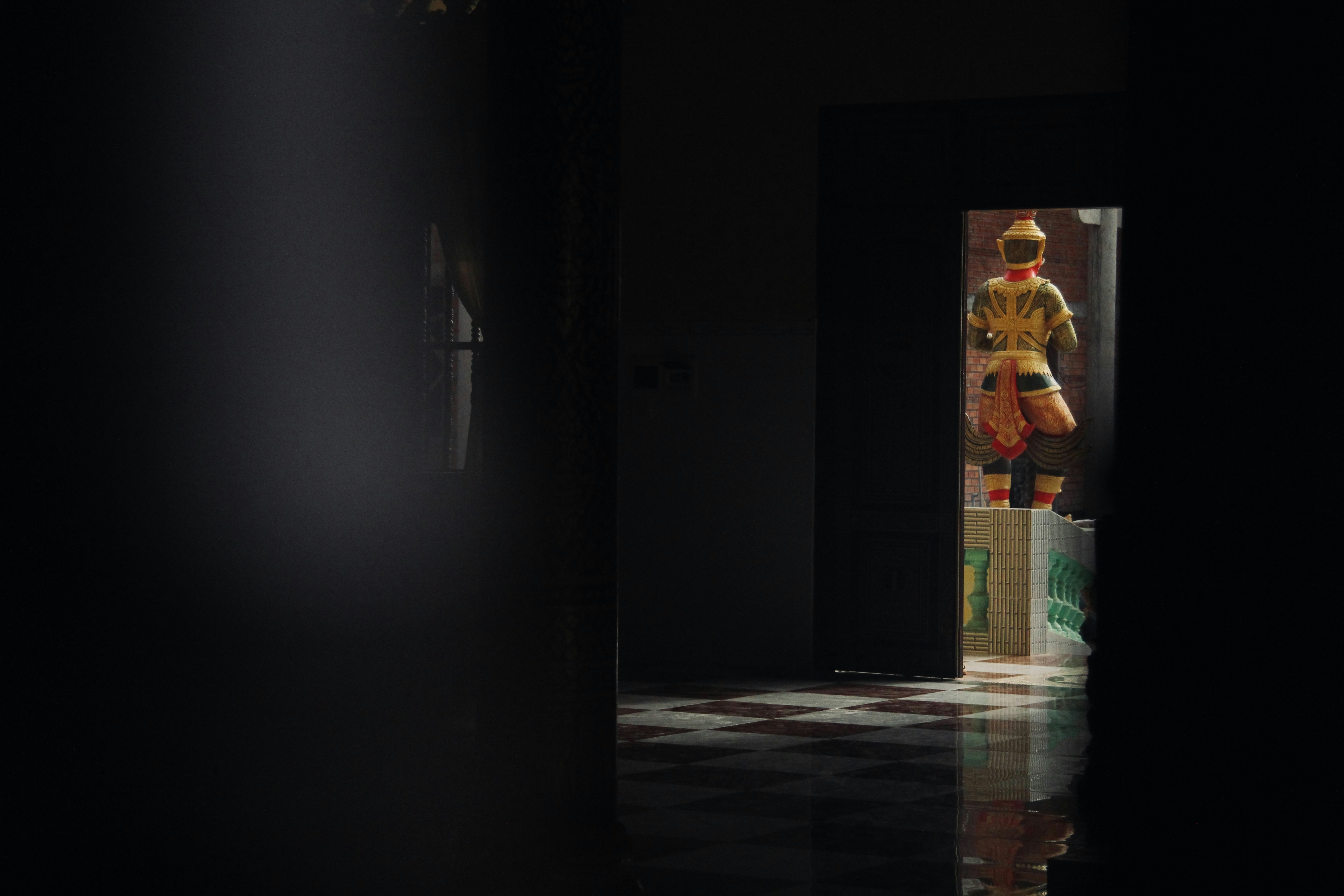 Through a Sliver of Light: A Subtle Portrait in a Hallway