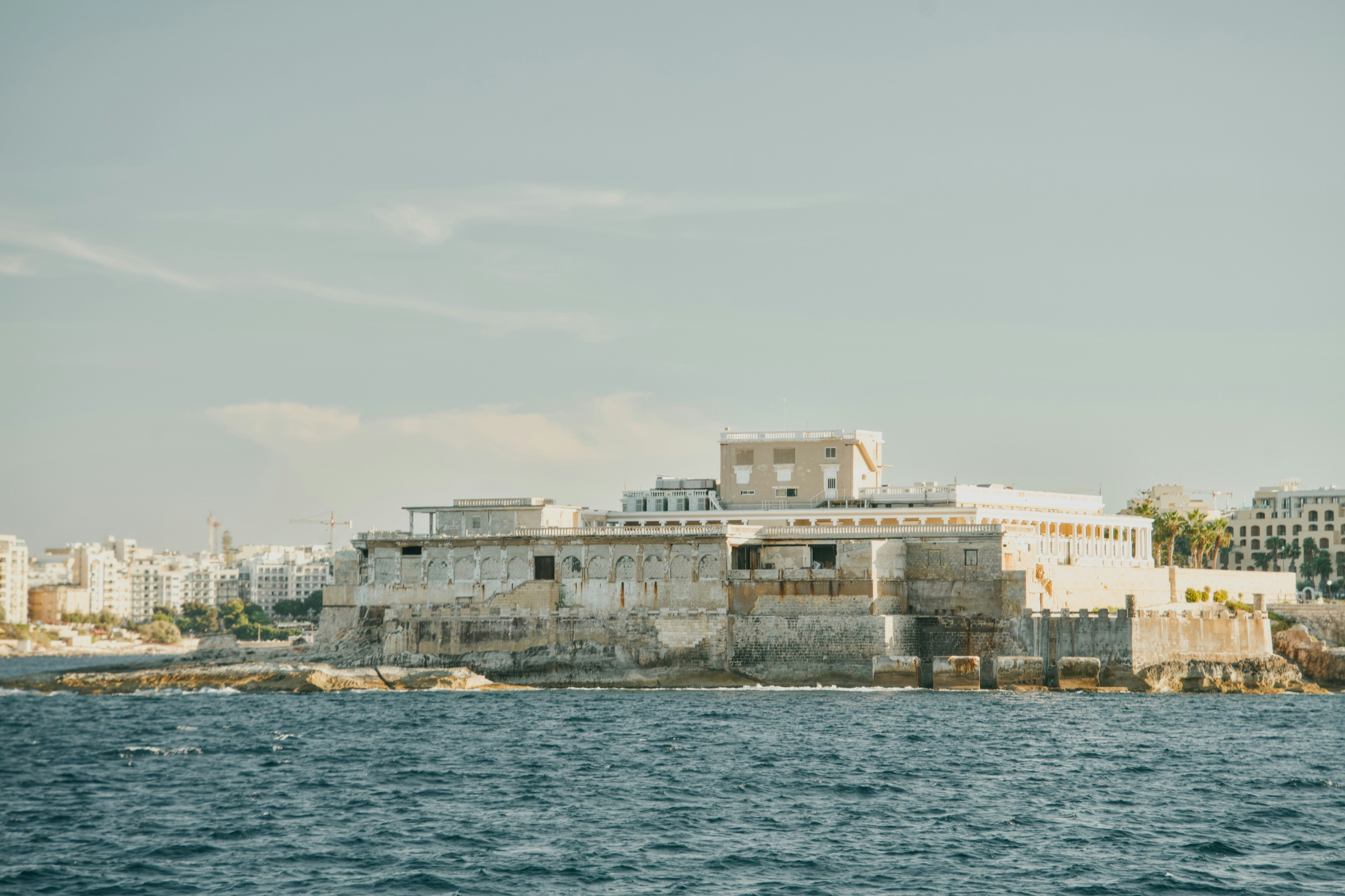 Fortress on the Horizon: Coastal Citadel Amid Gentle Waves