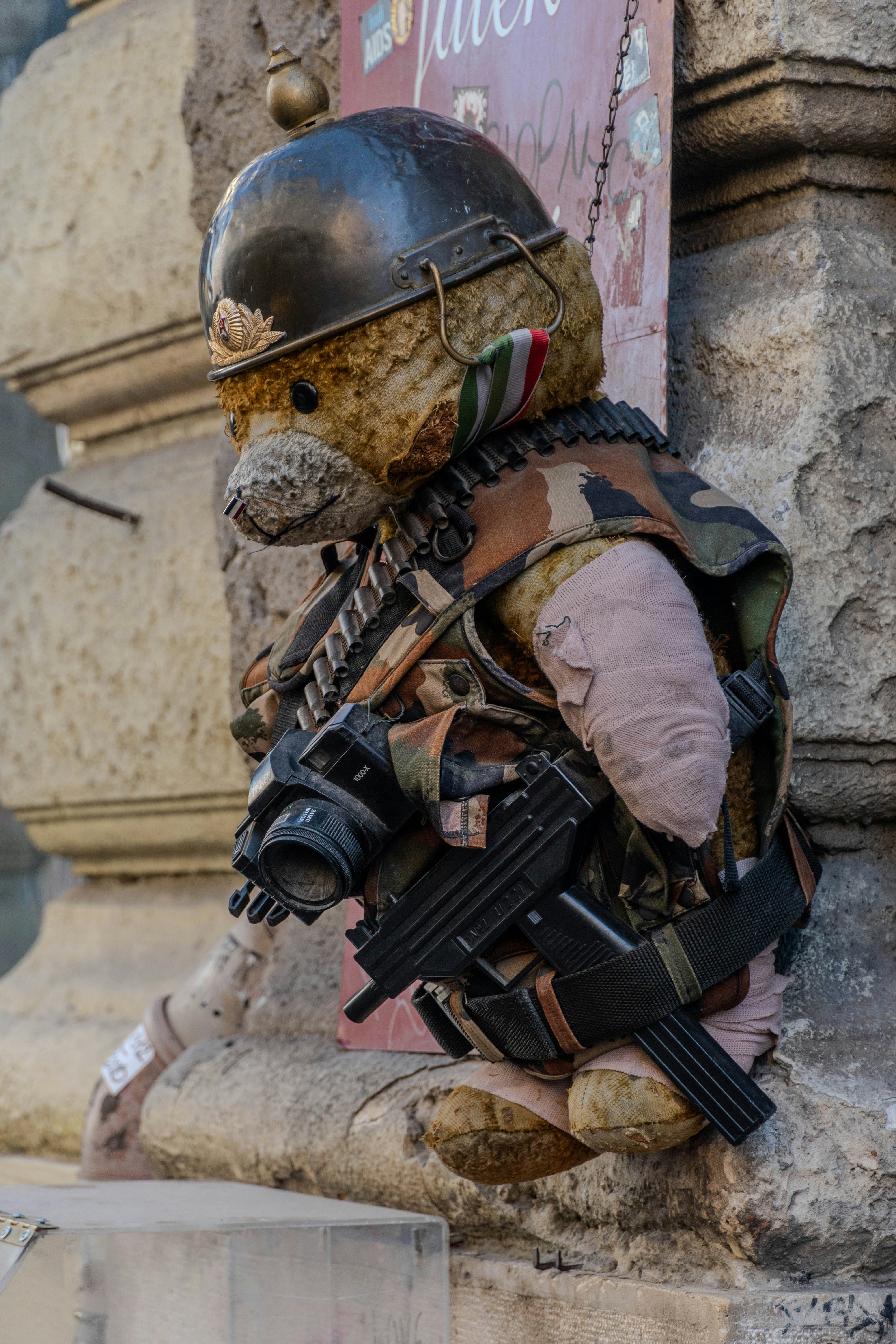 Titled Sentinel: A Weathered Prop Soldier Guards the Cornerstone