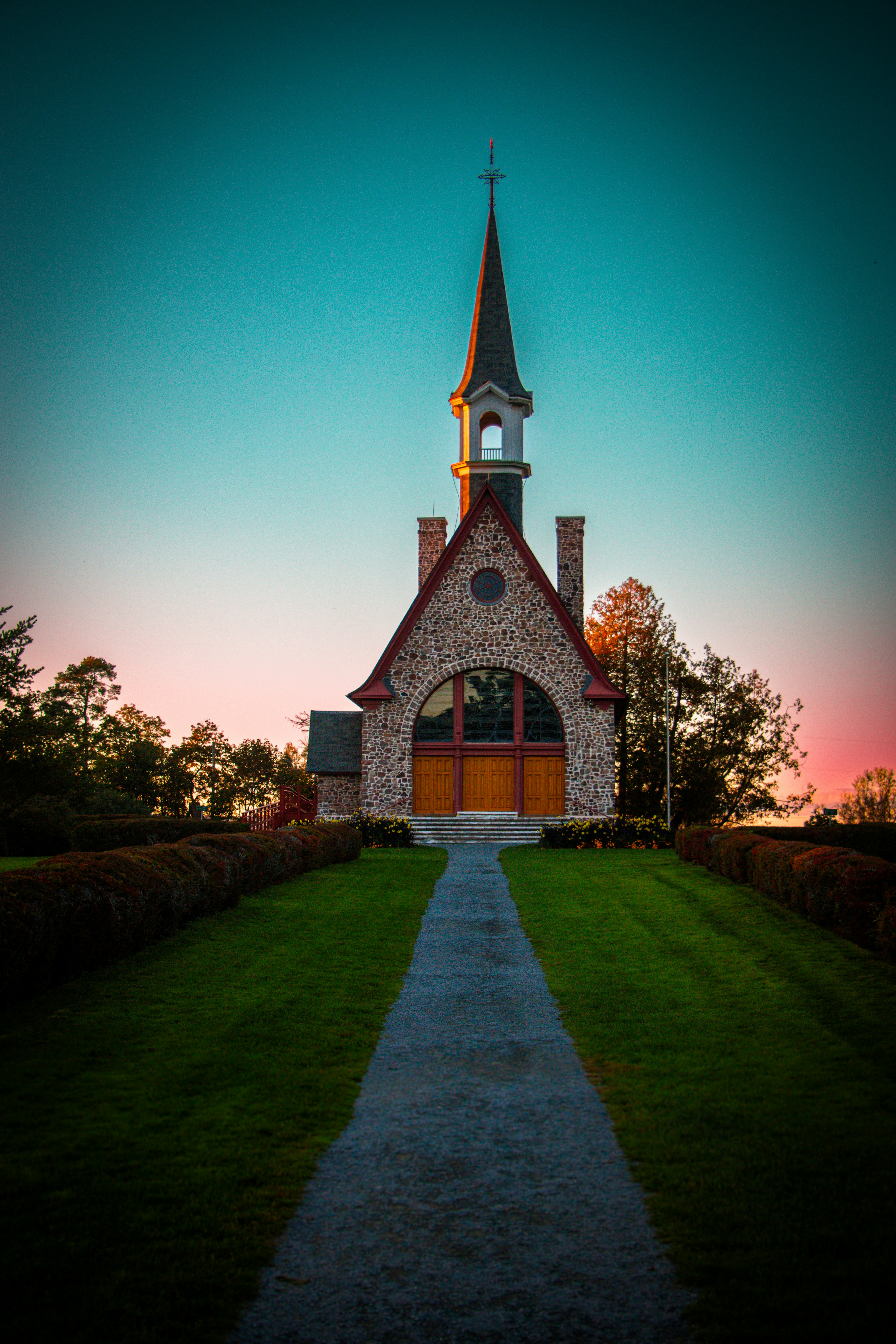 Chapelside Twilight: A Stone Chapel Reaches Toward a Velvet Sky