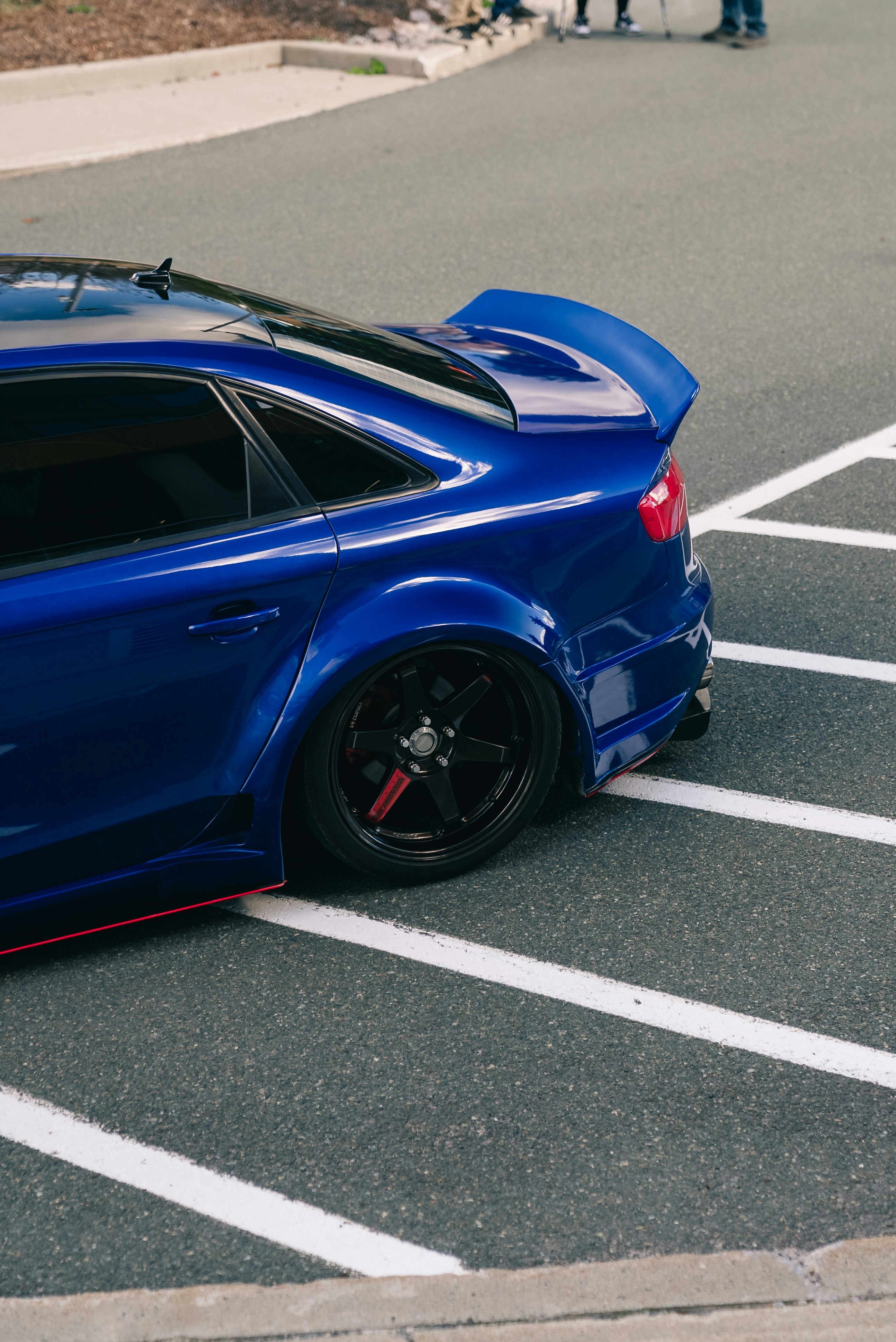 Blue Agile: A Low-Profile View of a Modified Sports Car