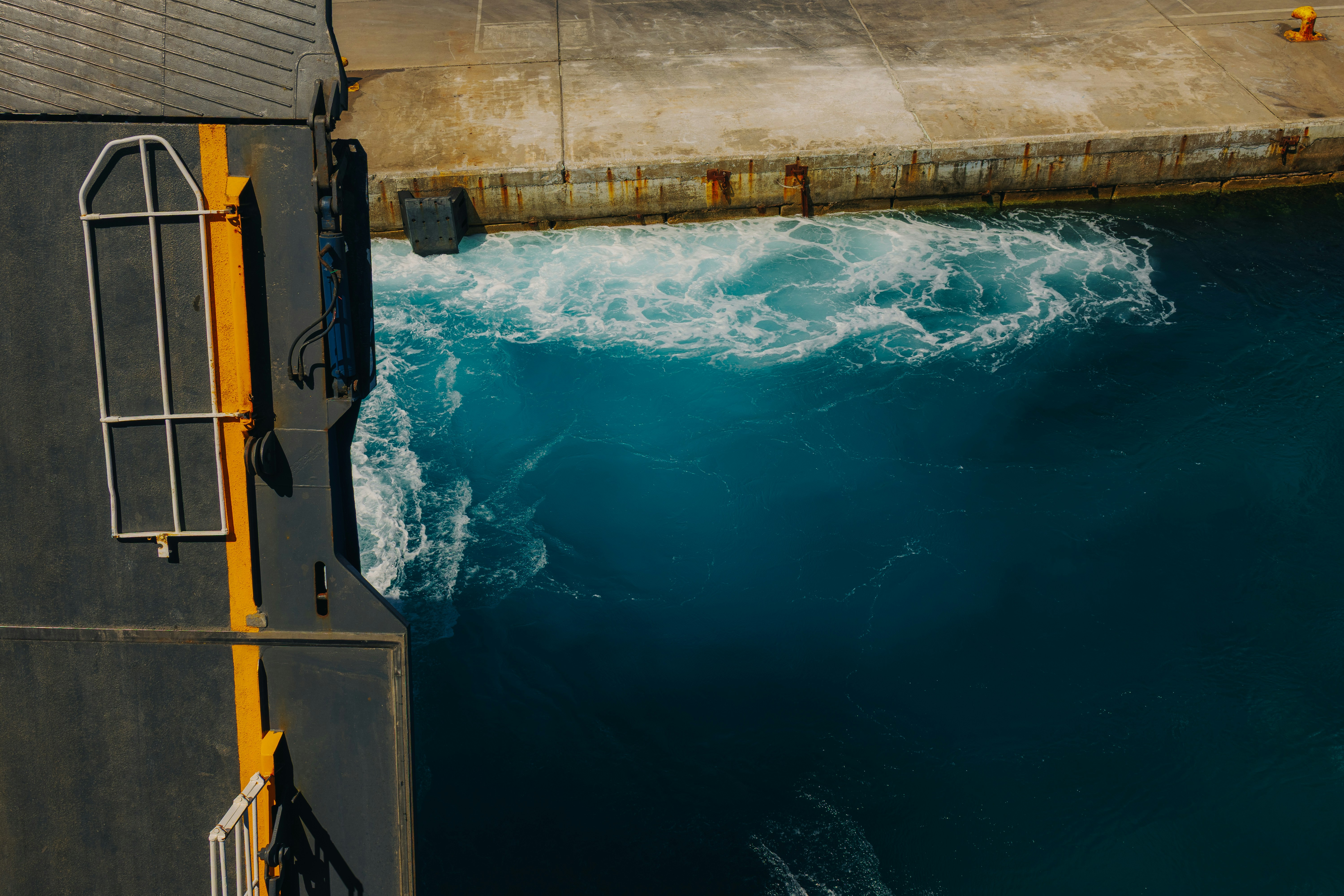 Edge of the Wharf: Blue Water Meets Concrete