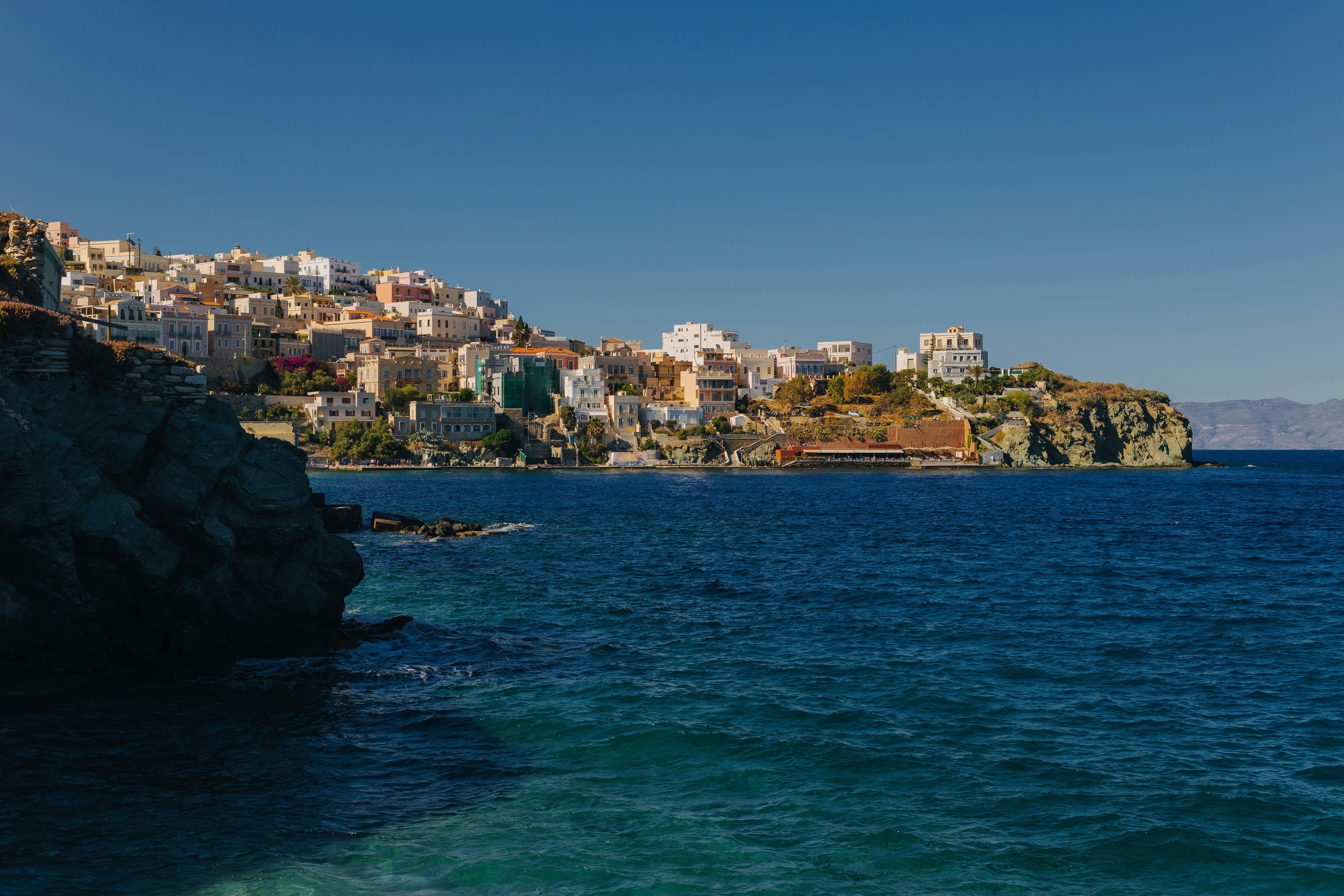 Harbor Cliffside Village Under a Clear Blue Sky