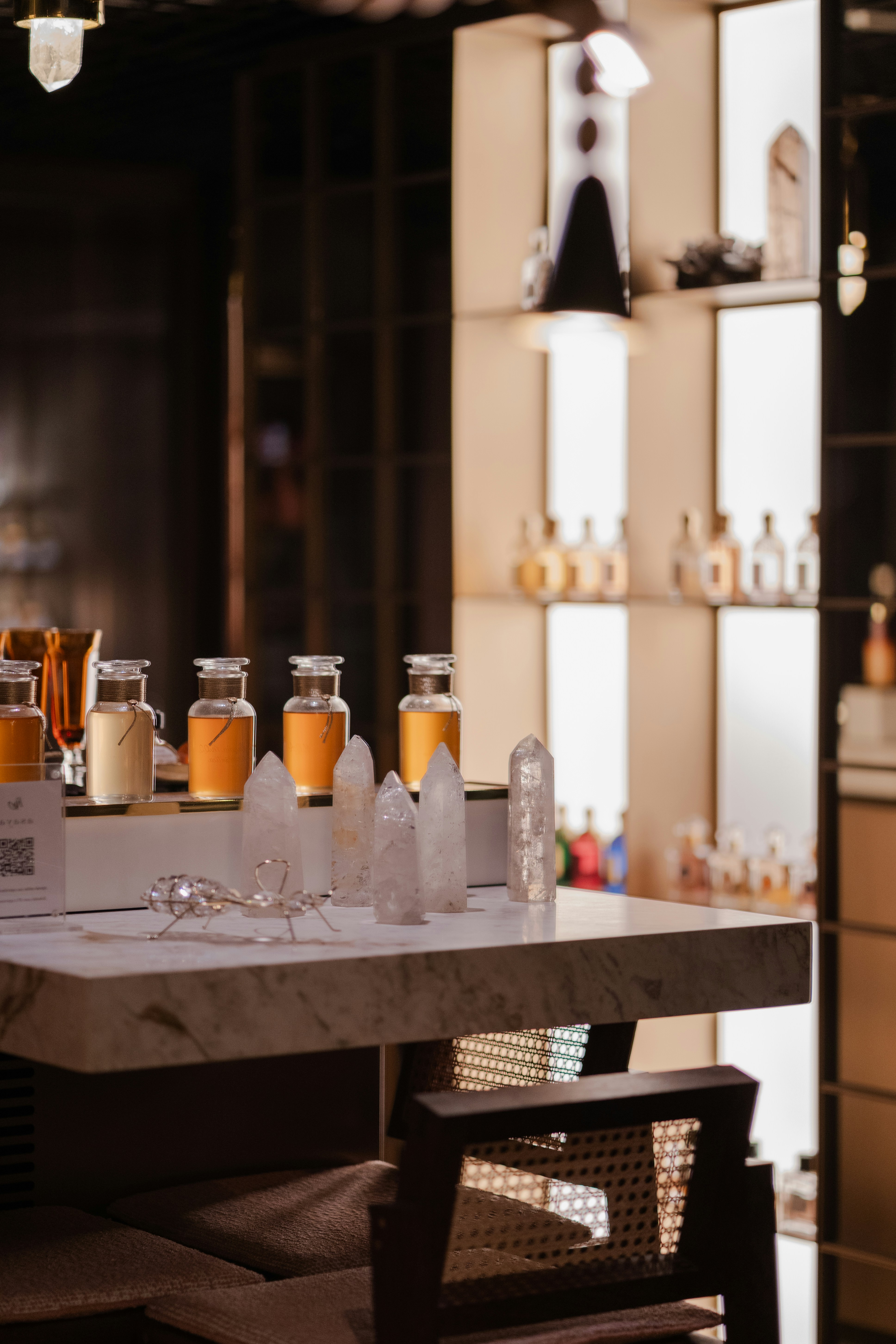 Crystal Charms on Marble Counter: A Quiet Bar Scene