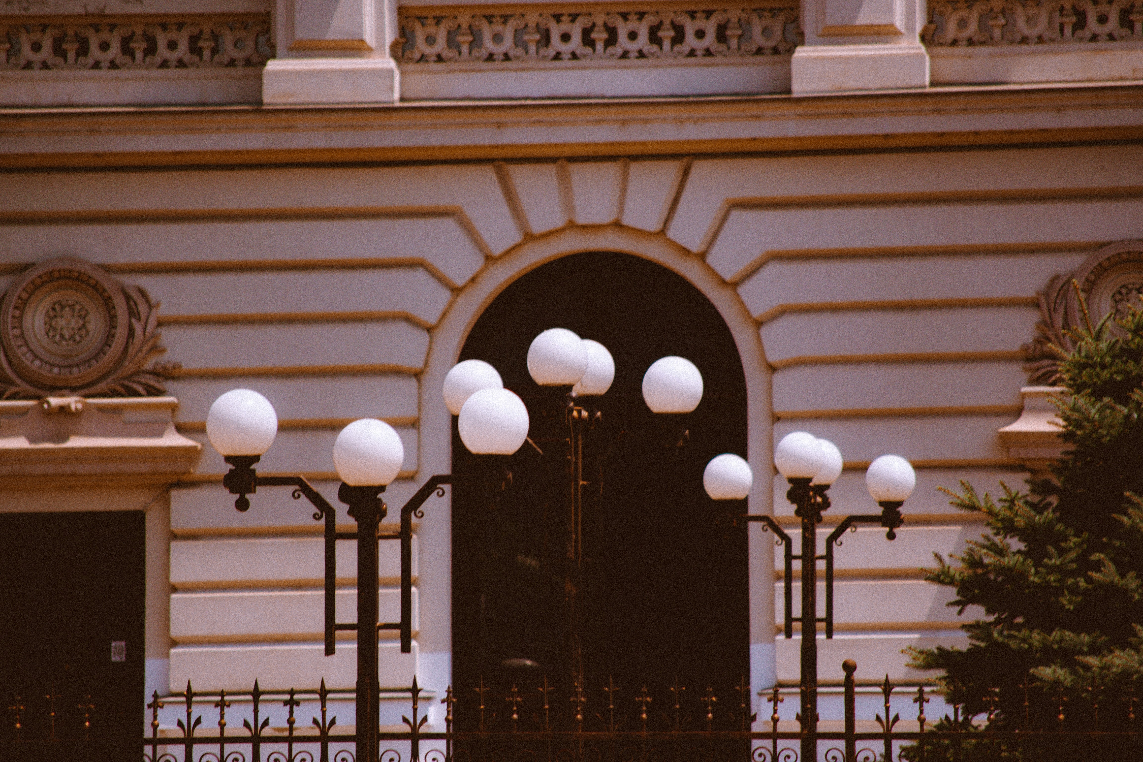 Gilded Facade and Orbital Lamps: Symmetry at the Steps