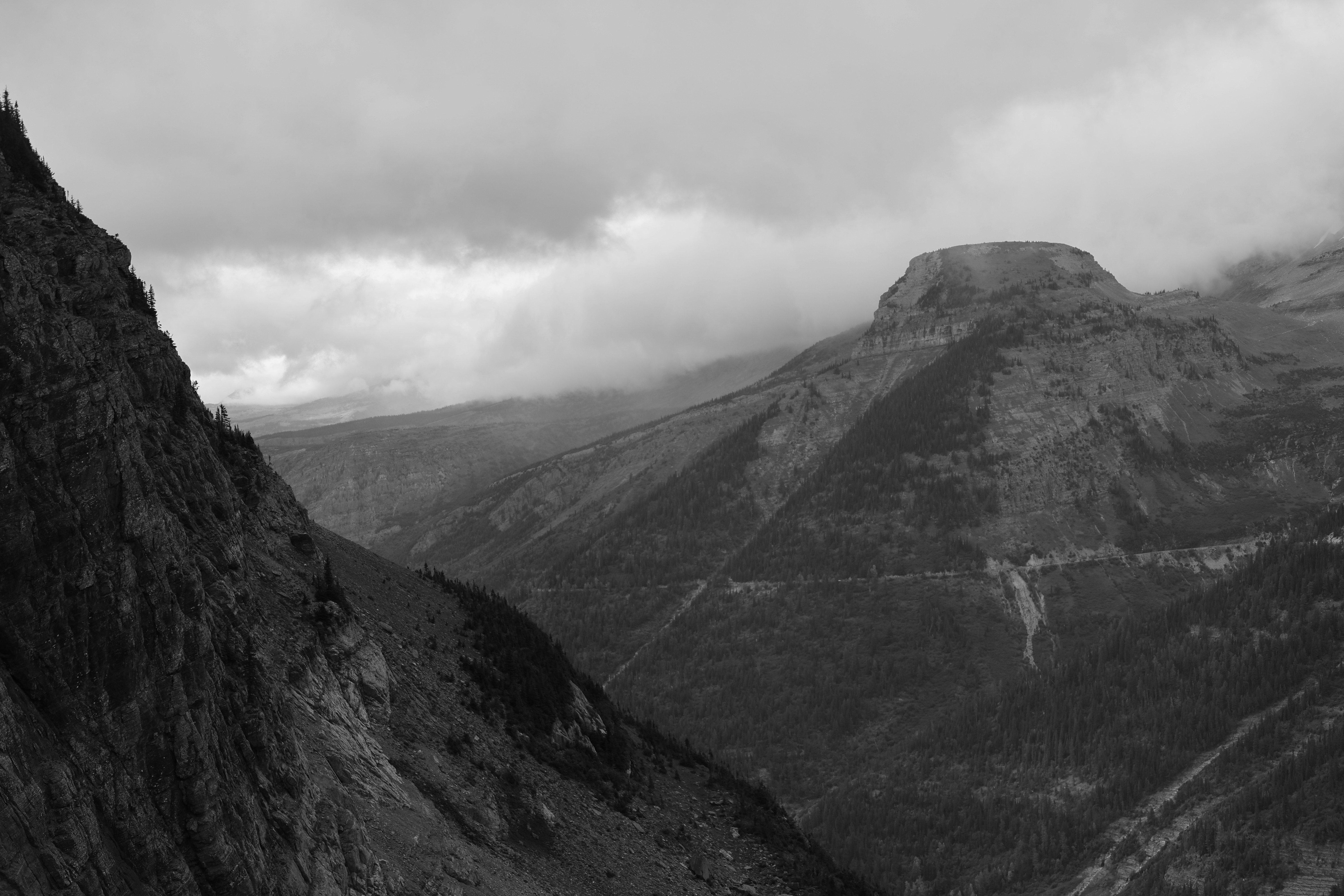 Mist-Laced Convergence Over Alpine Pass