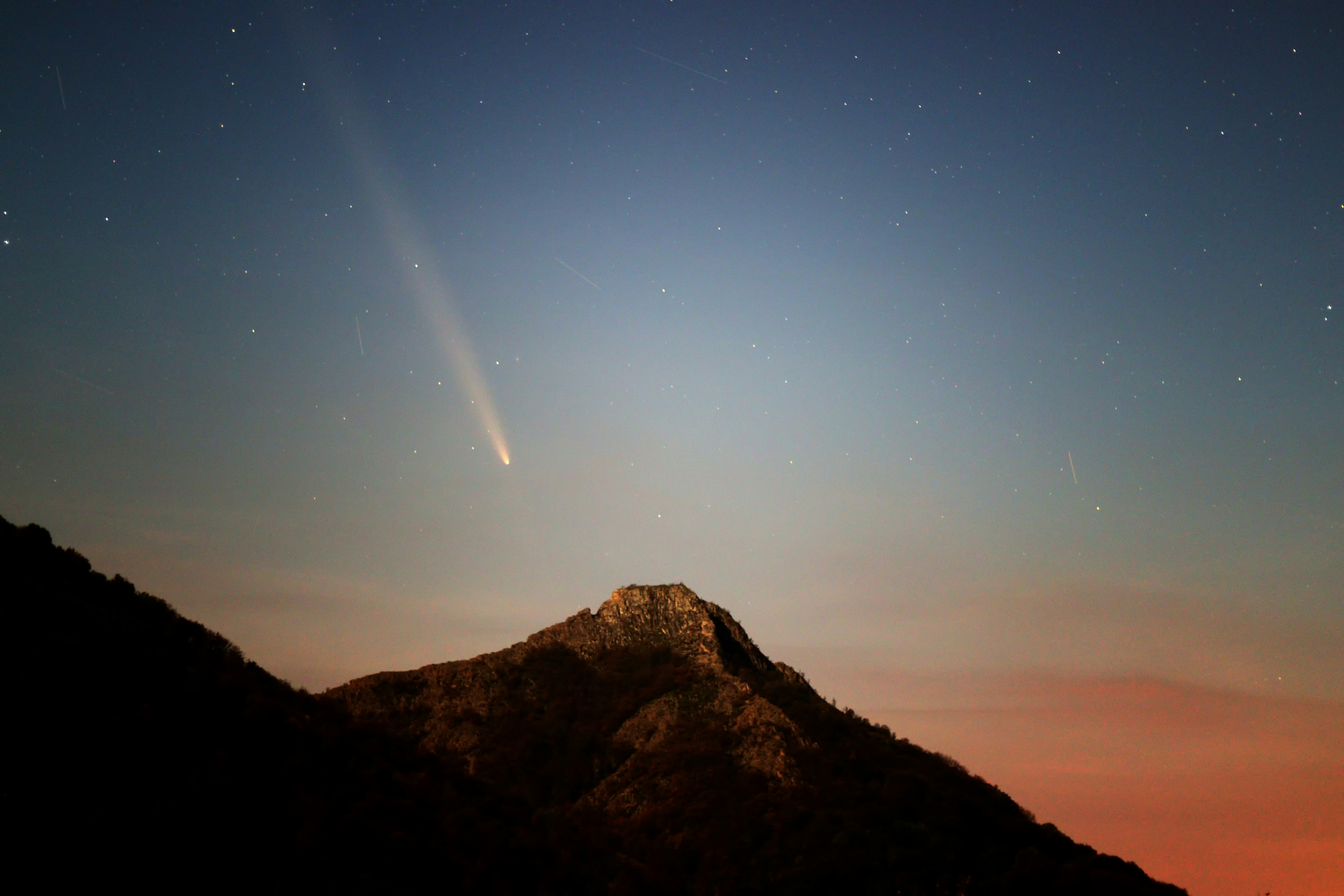 Comet in the Twilight Above the Summit