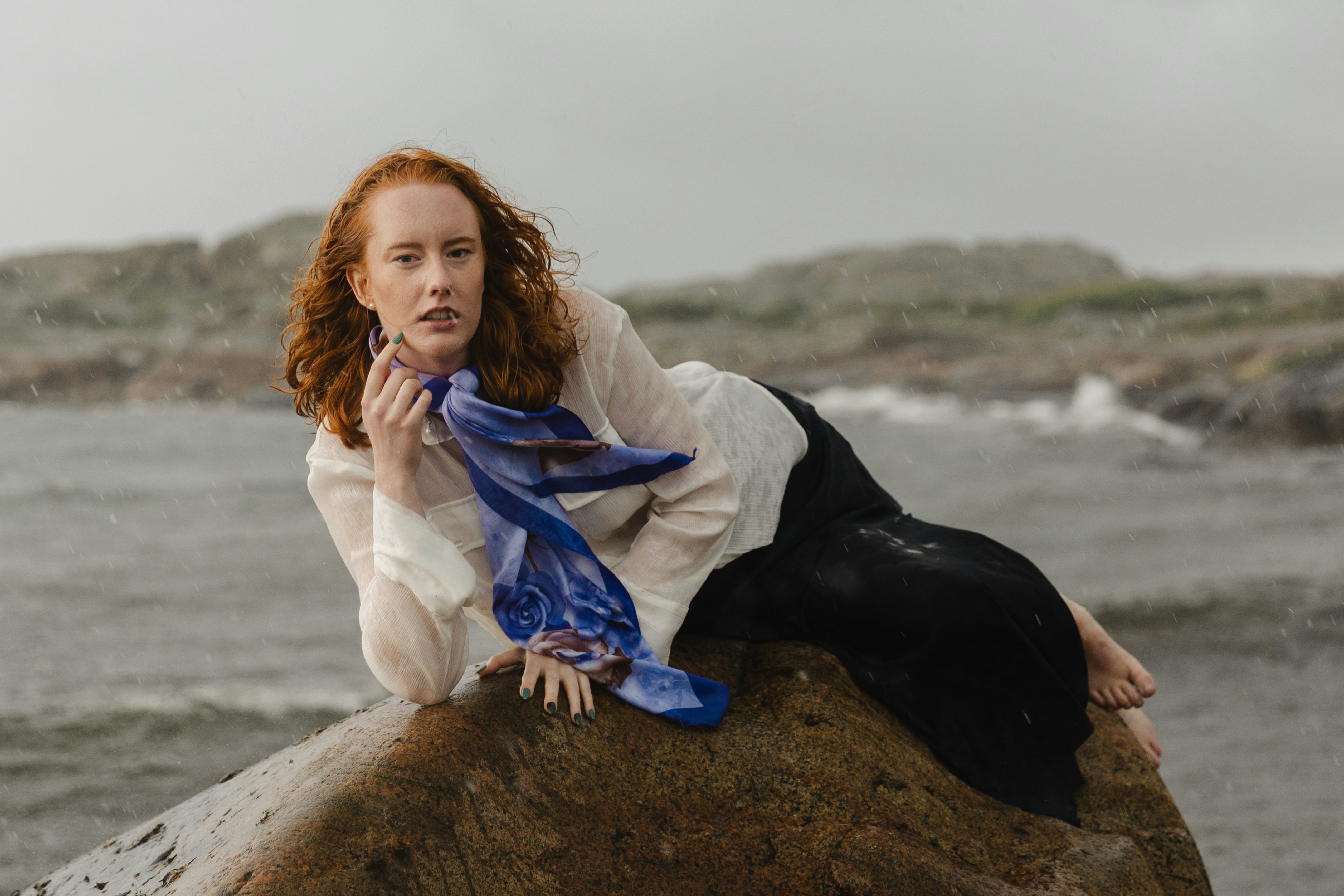Red-Haired Poise on Wet Rock: Scarf of Ocean Mist