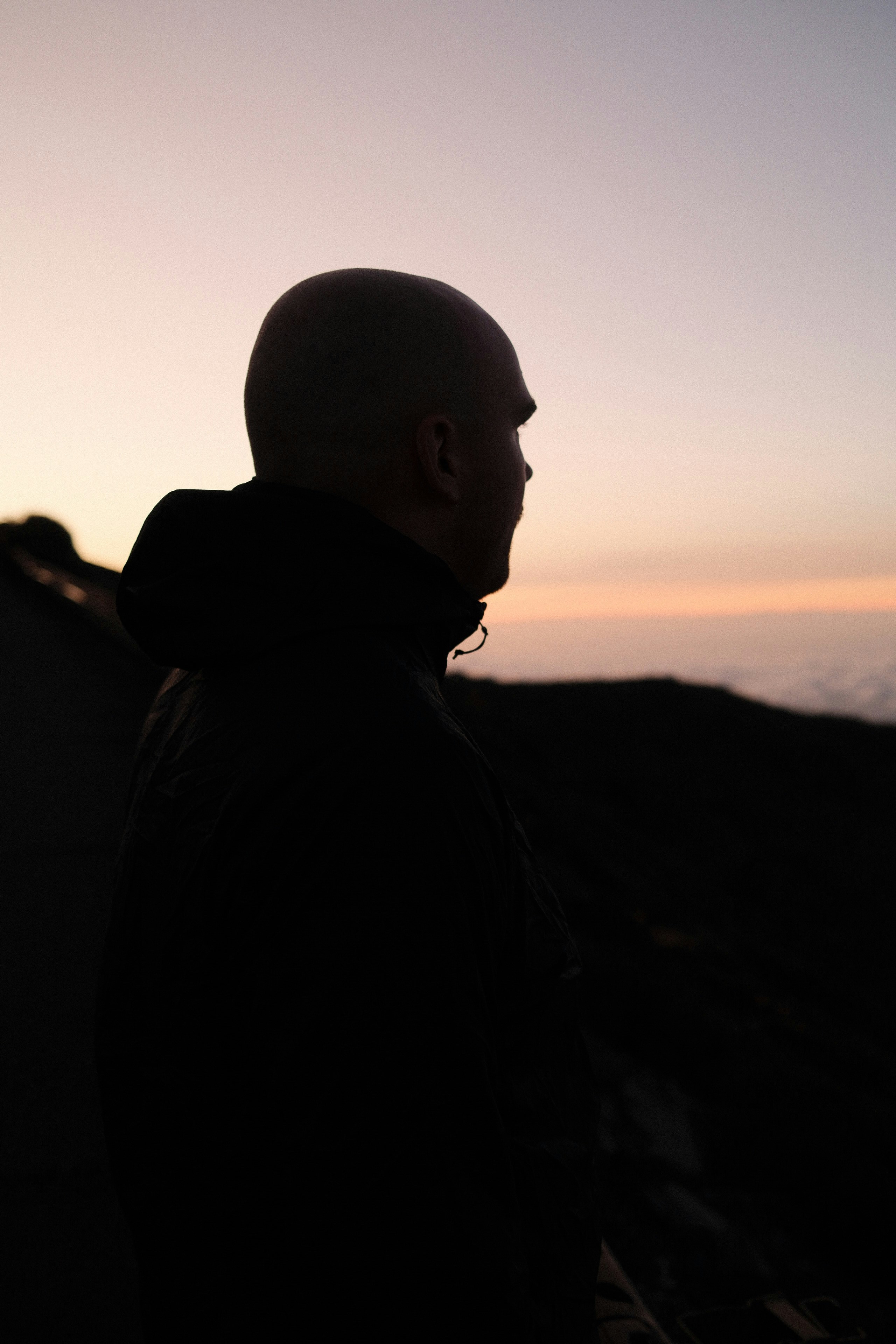 Silhouette at Dusk: A Quiet Coastal Portrait