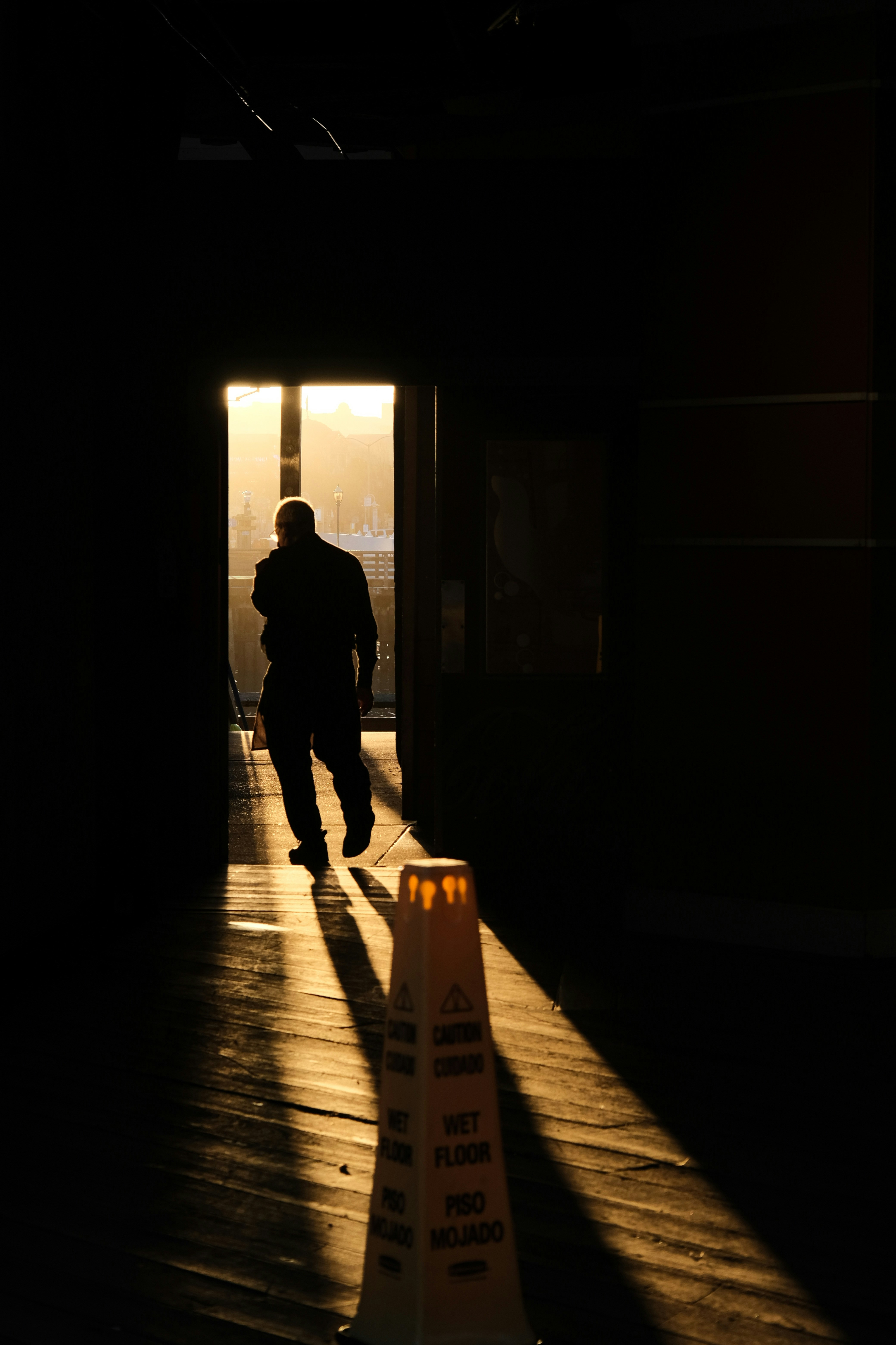 Shadowed Step: A Silhouette in the Reach of Golden Light