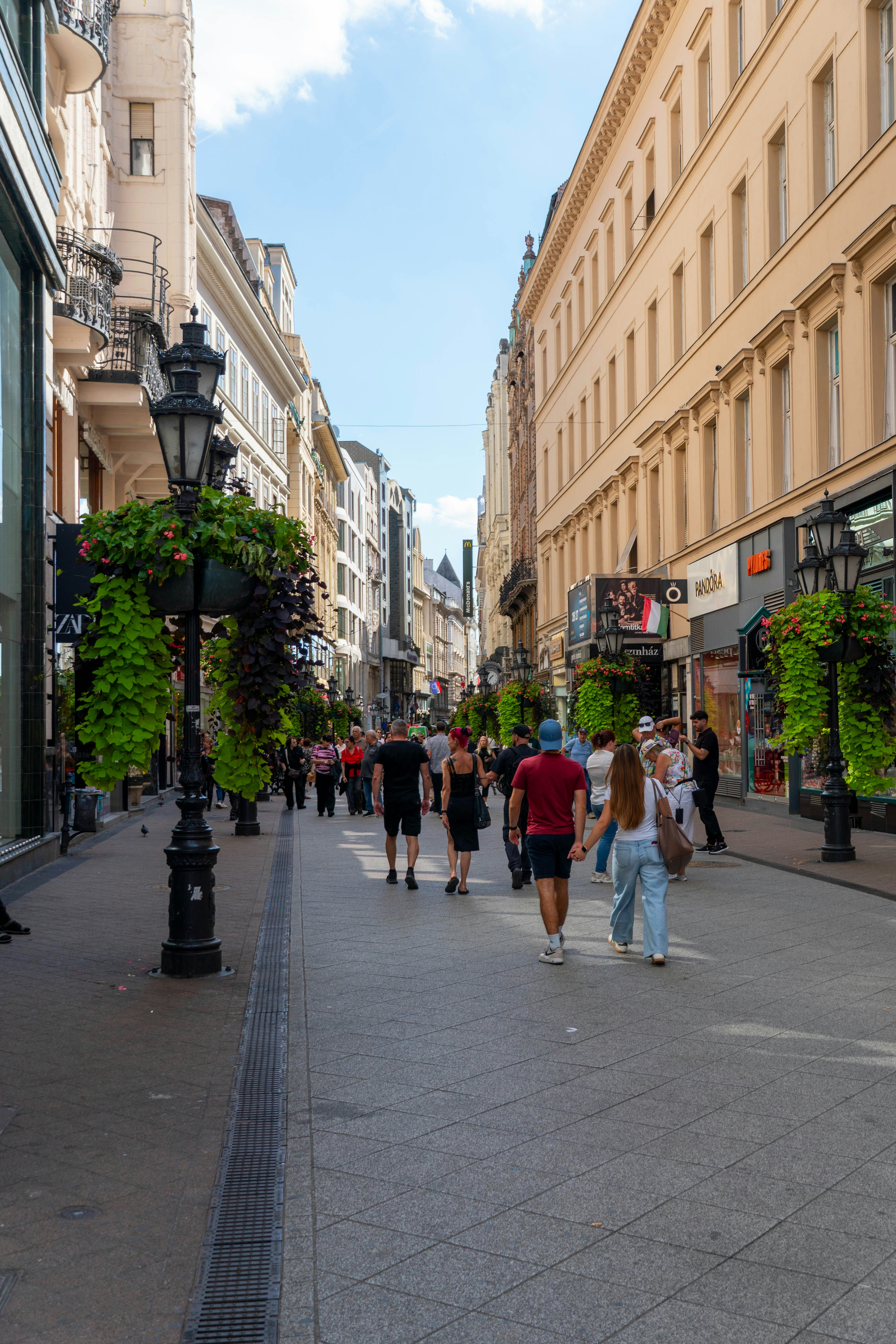 City Walk: Sky, Stone, and Shadowed Strides