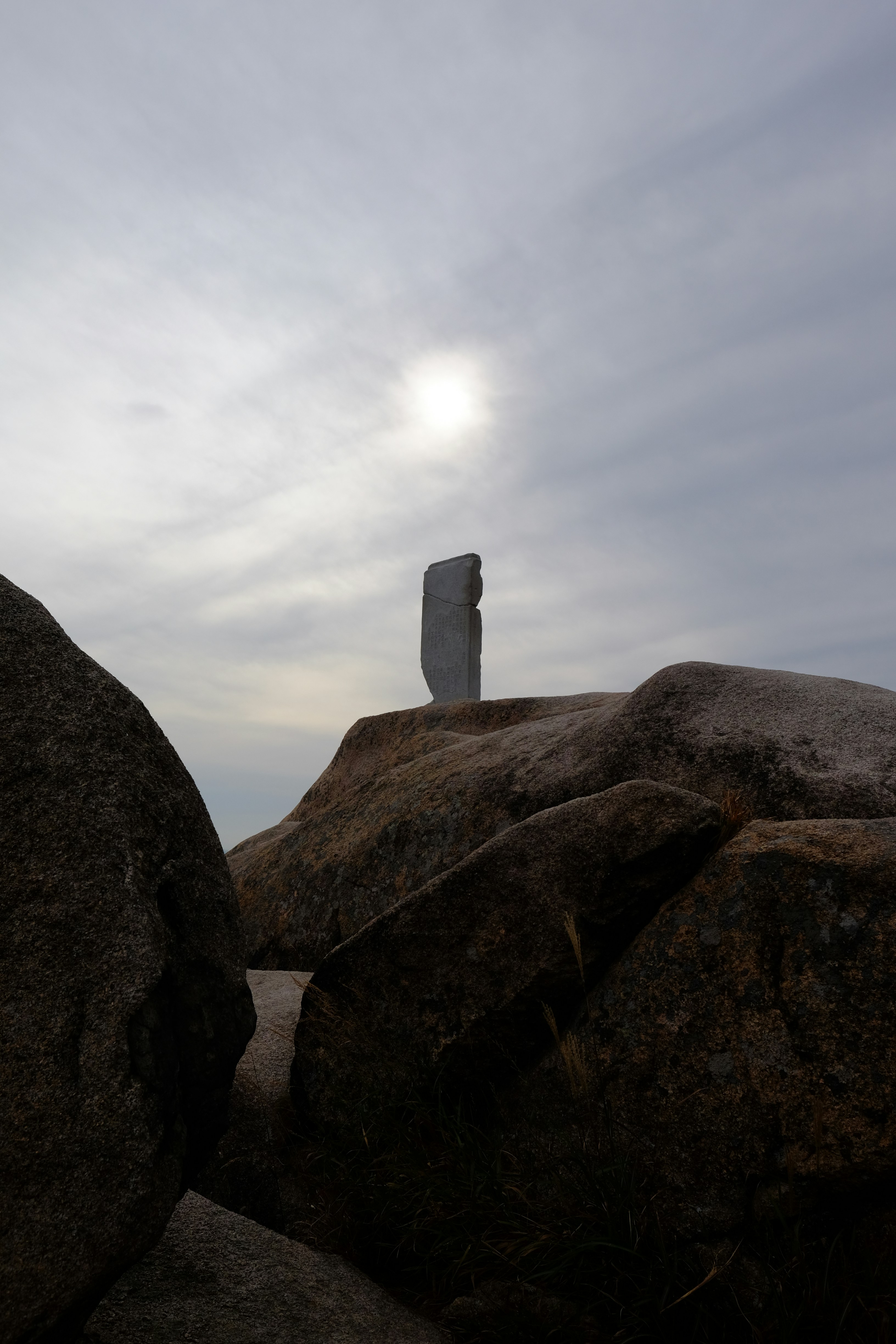 Stone Sentinel: A Narrow Pillar Balancing on Wind-Scoured rocks
